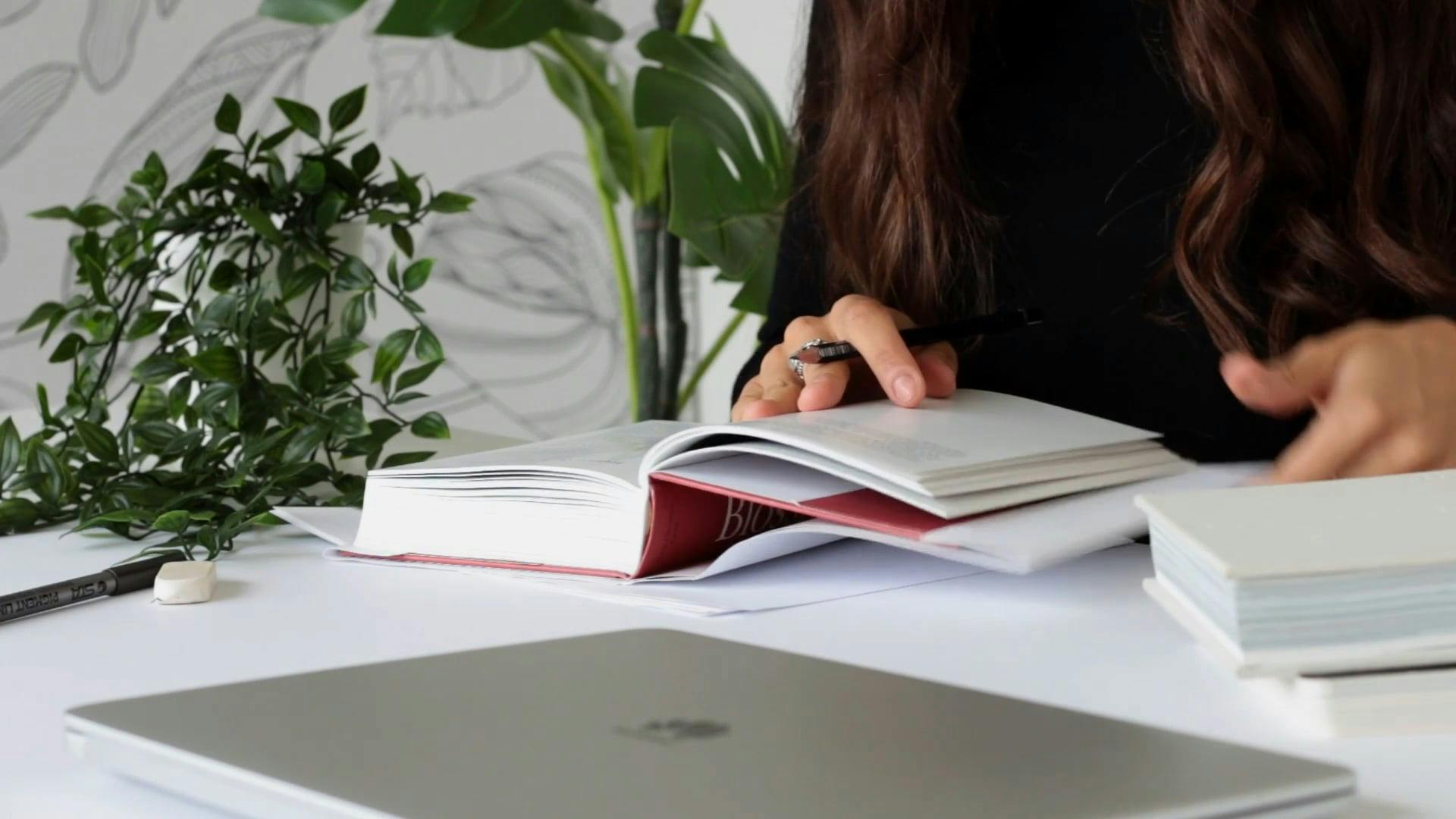 Man Taking Notes From A Book · Free Stock Video