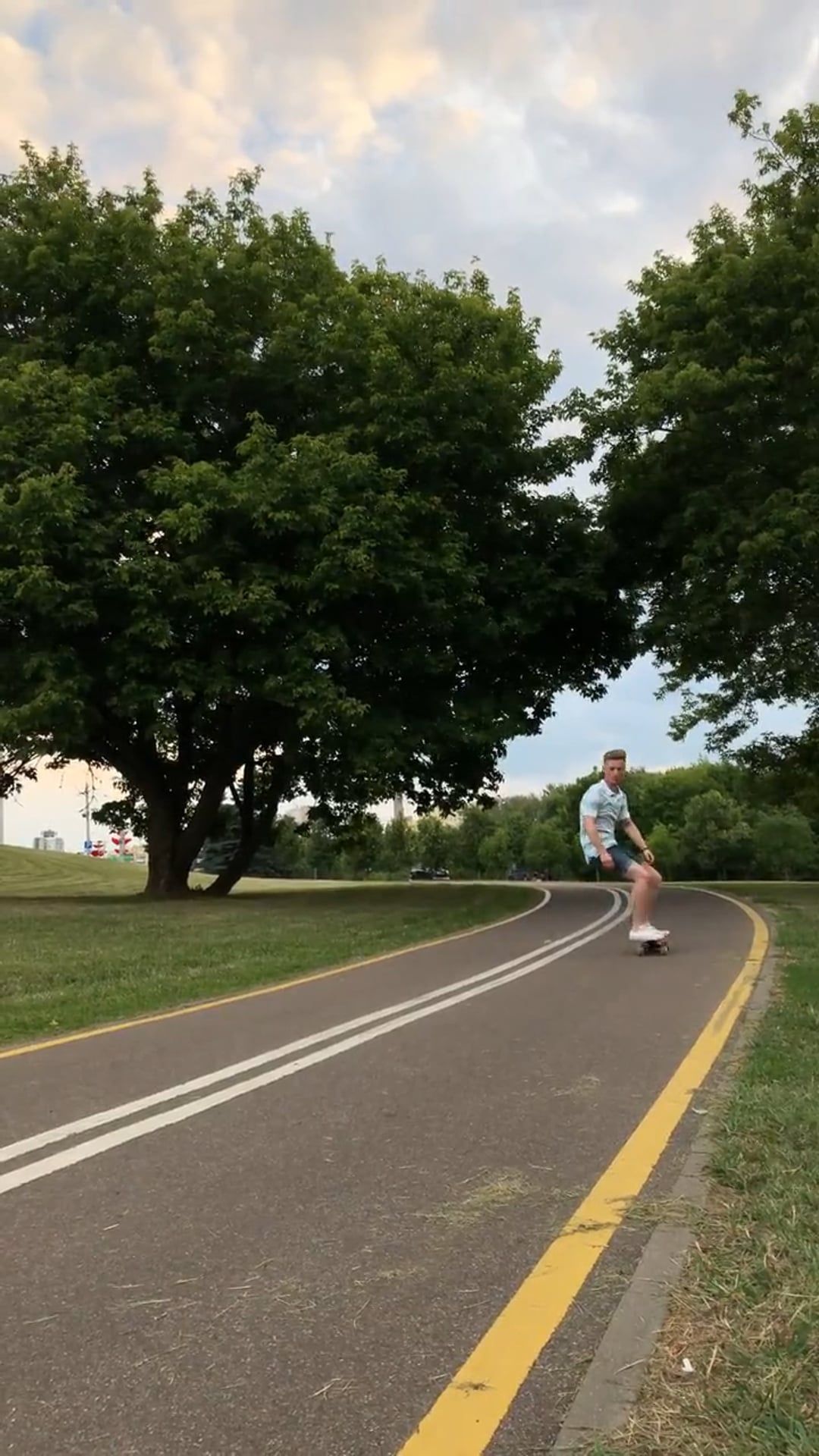 A Person Riding a Longboard on Asphalt Road · Free Stock Video