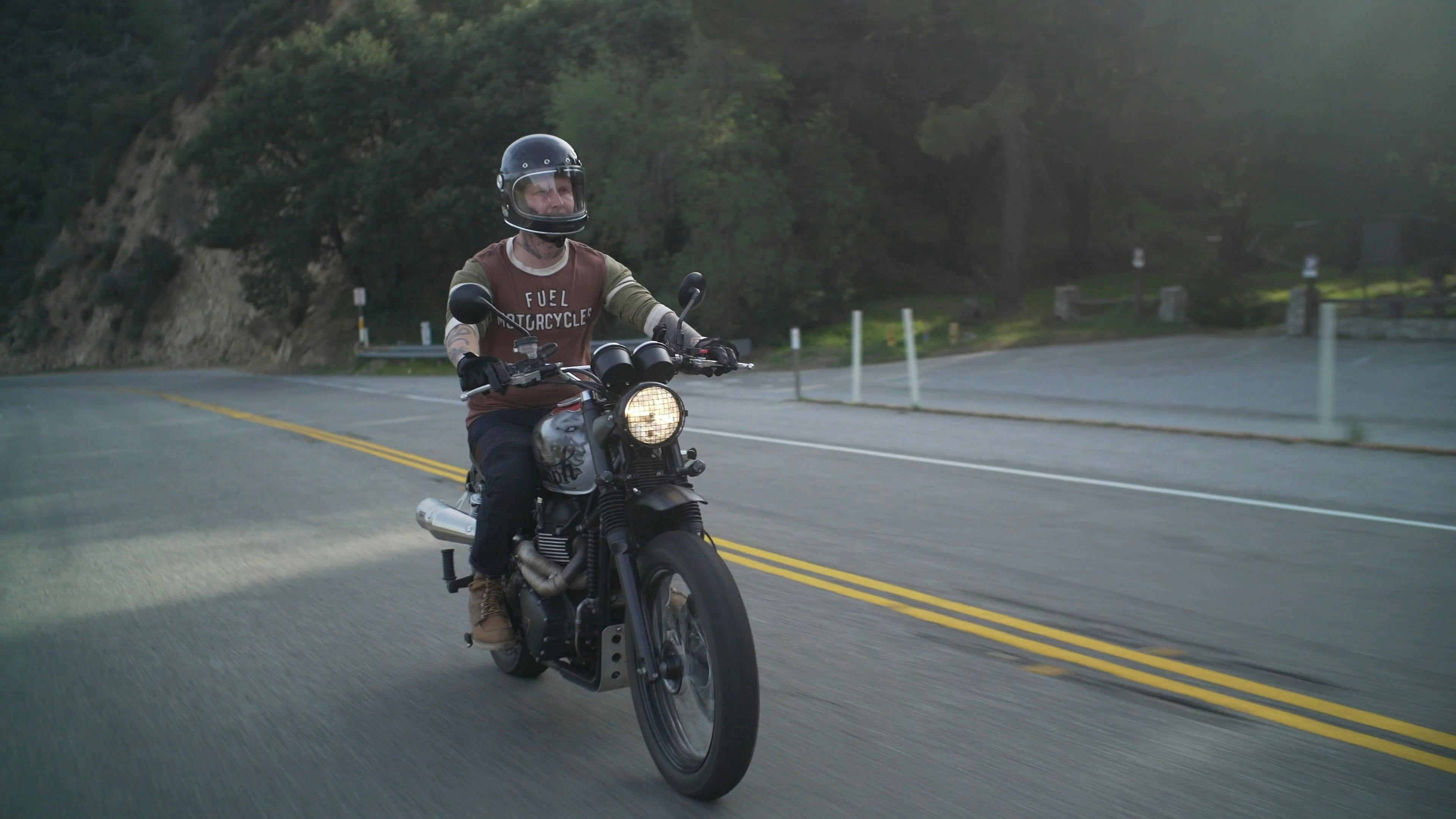 A Man Riding a Motorcycle · Free Stock Video