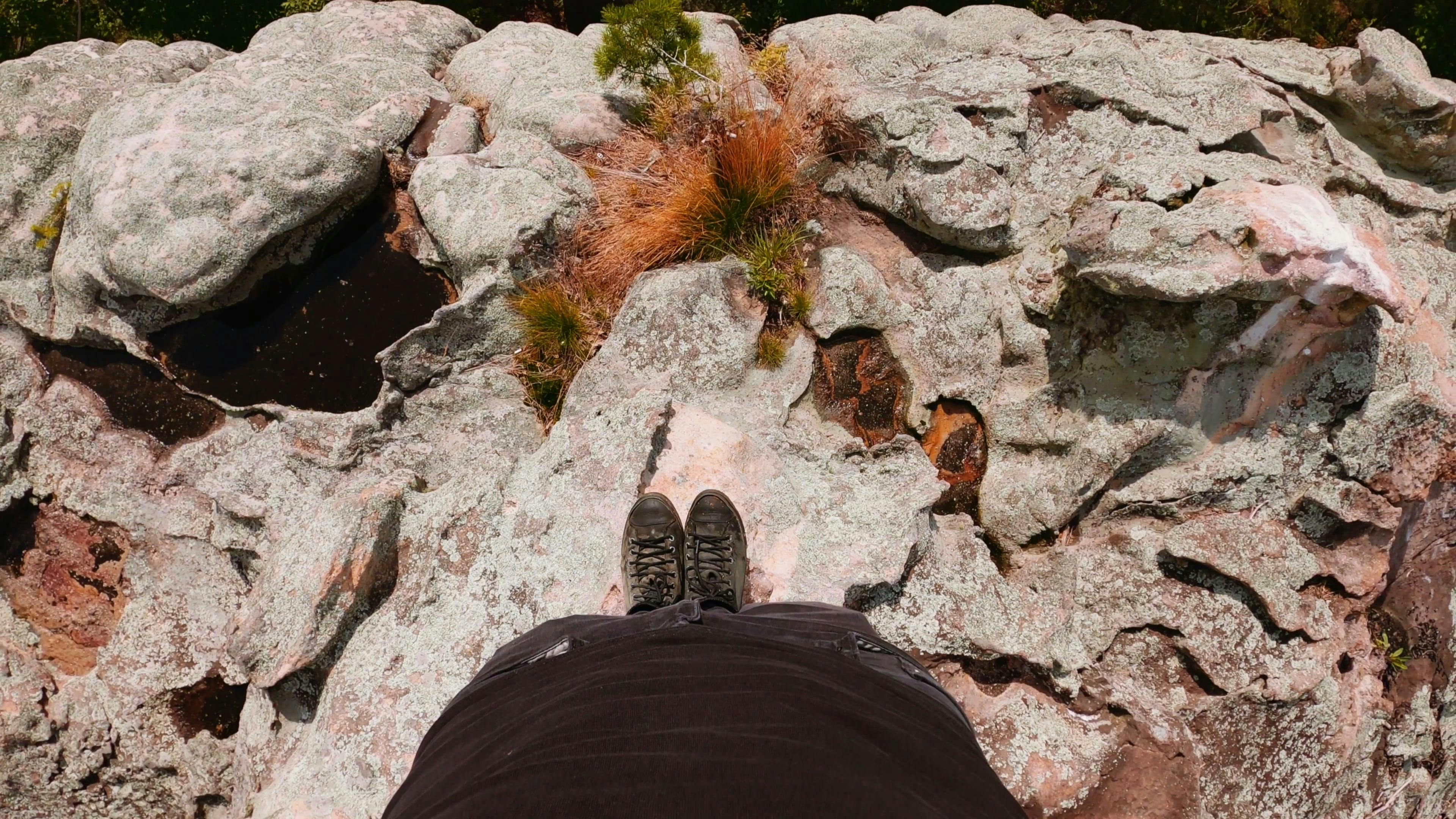 A Person Walking on the Edge · Free Stock Video