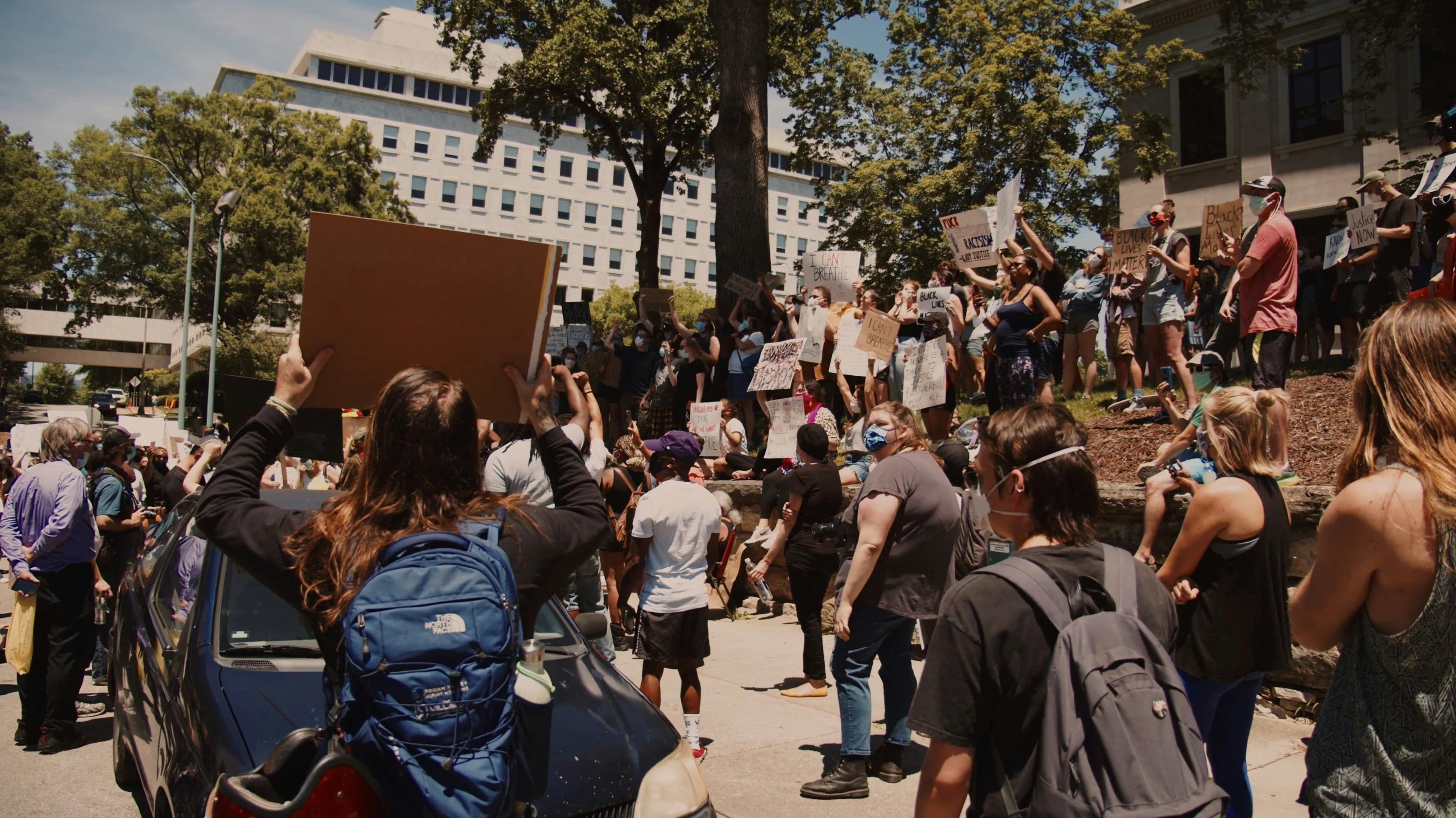 People Protesting and Holding Placards · Free Stock Video