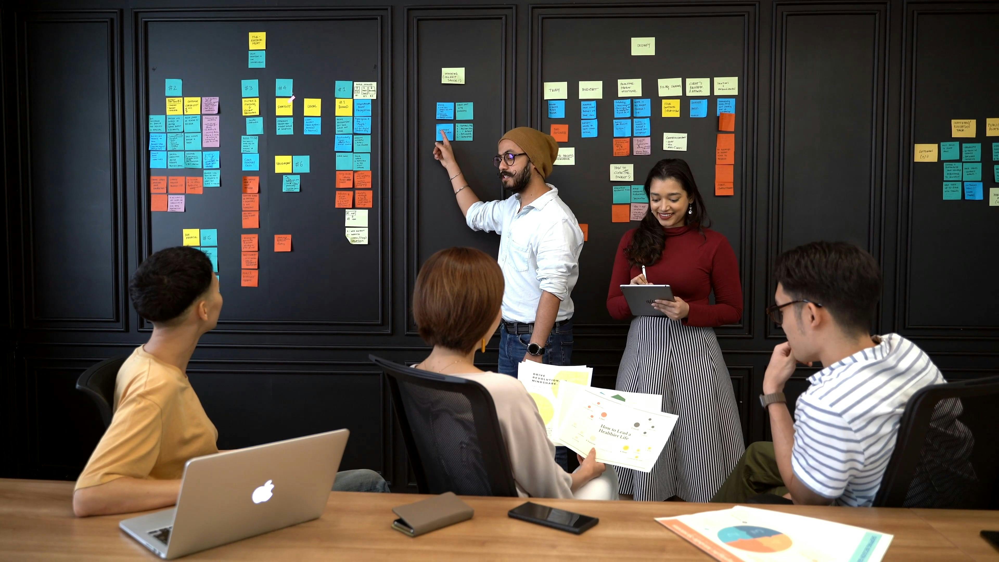 A Man with a Moustache Discussing Ideas to the Team Free Stock Video ...