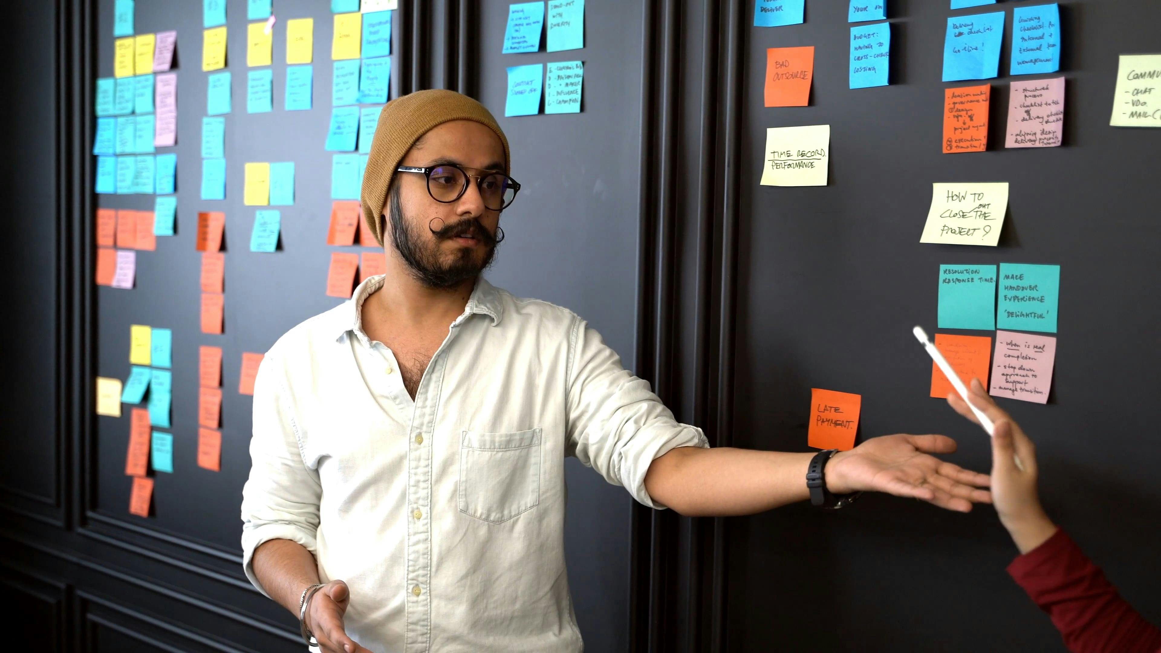 Video Of Man Discussing With His Colleagues · Free Stock Video