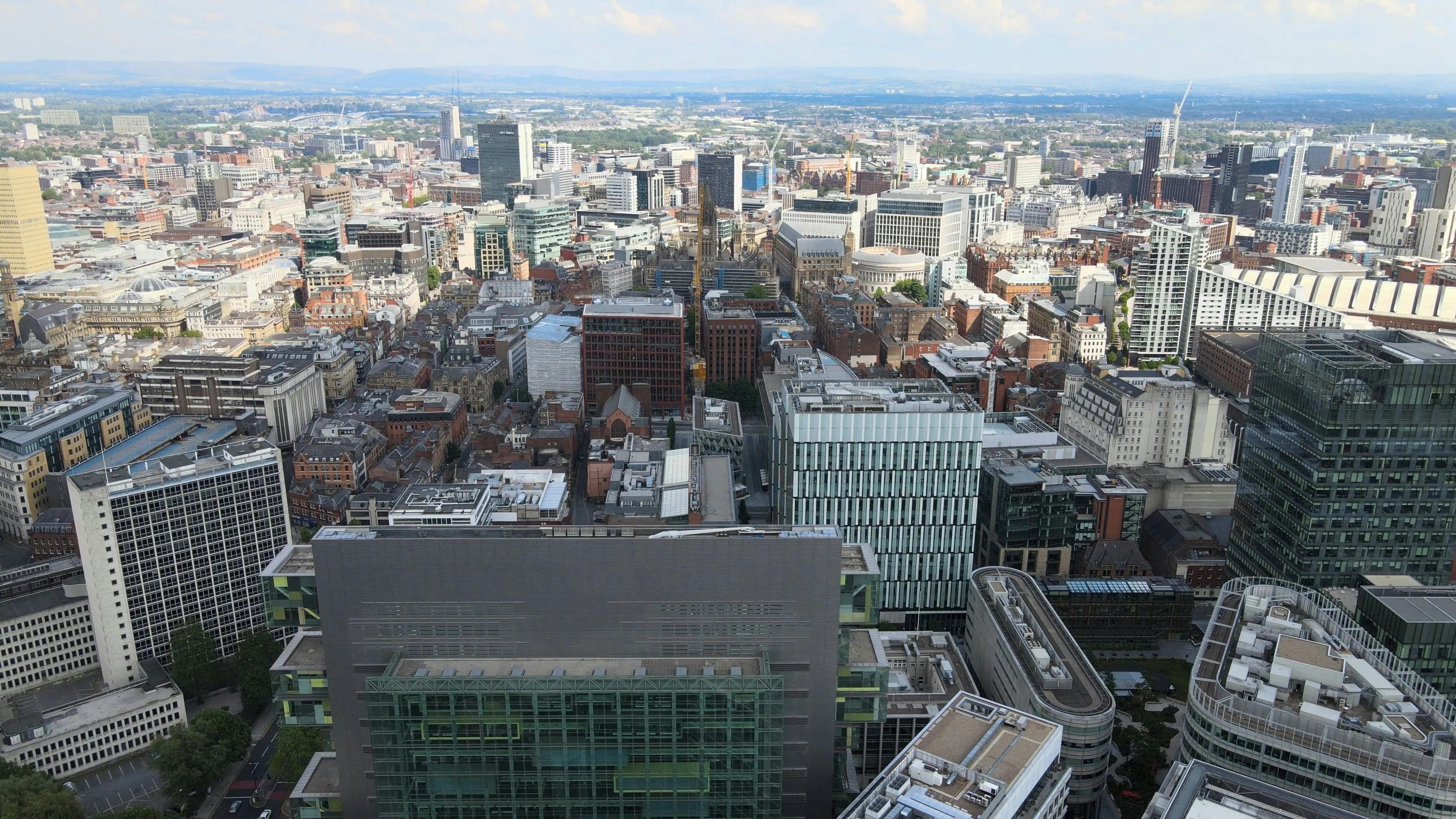 A Modern Building Towering In The Center Of A City Free Stock Video ...