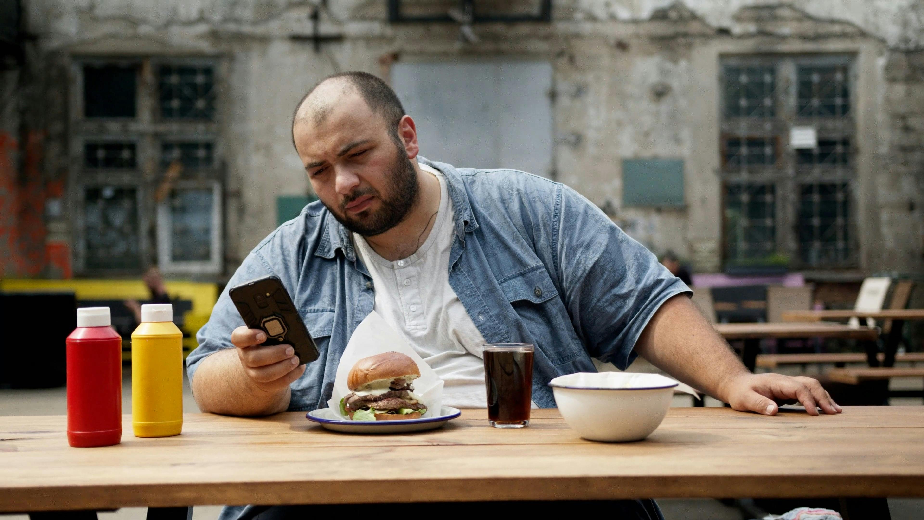 Man Eating a Fast Food Meal · Free Stock Video