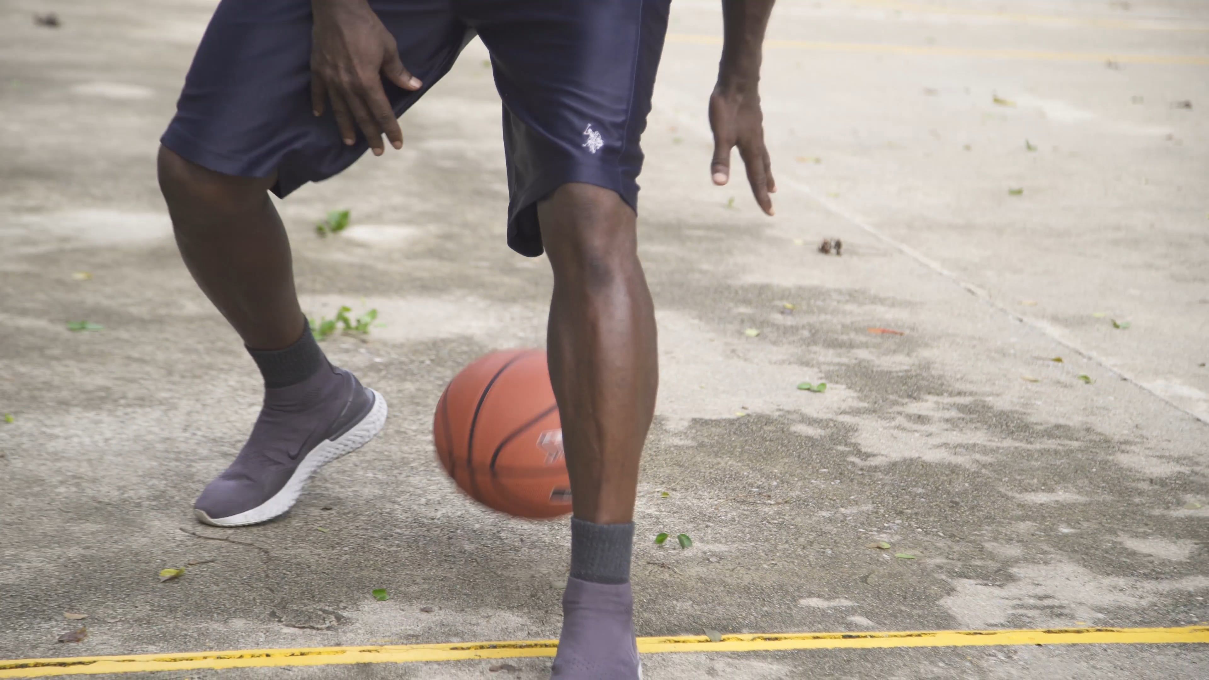 Person Dribbling the Basketball · Free Stock Video