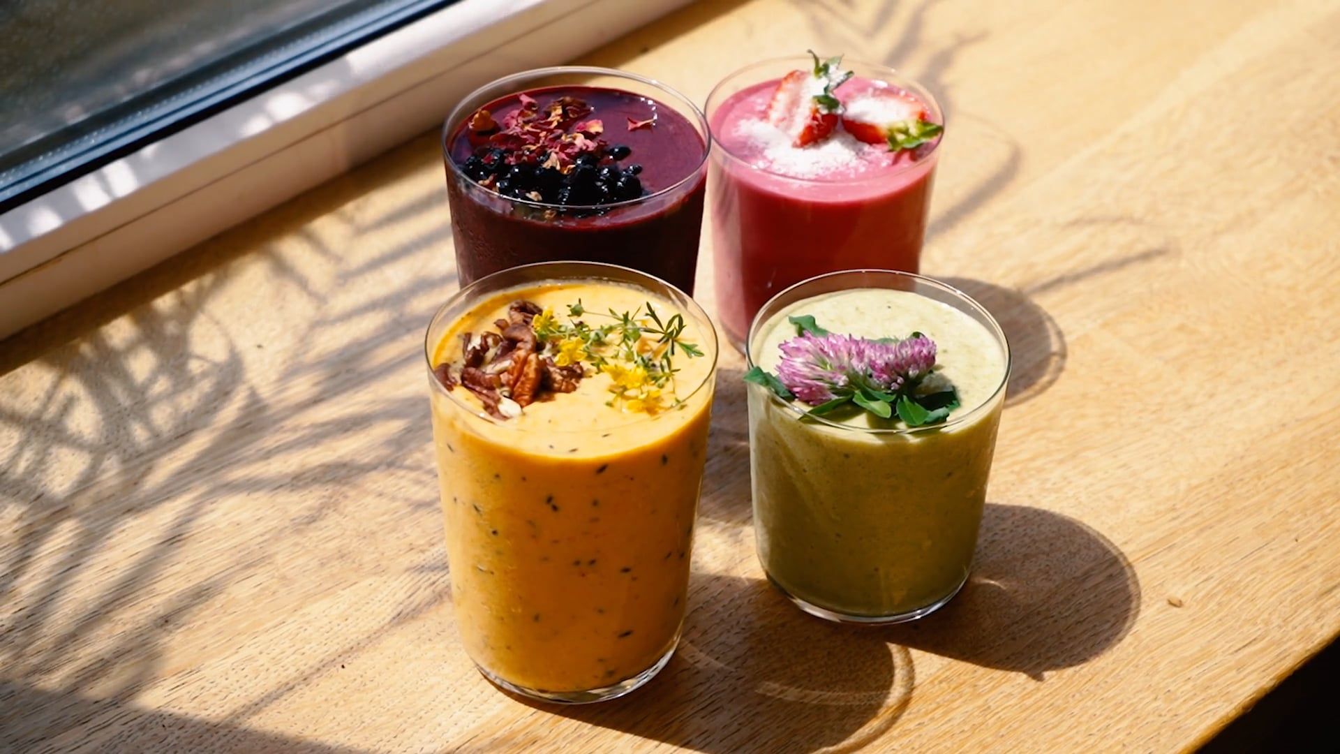 A Variety Of Smoothies On A Wooden Table · Free Stock Video