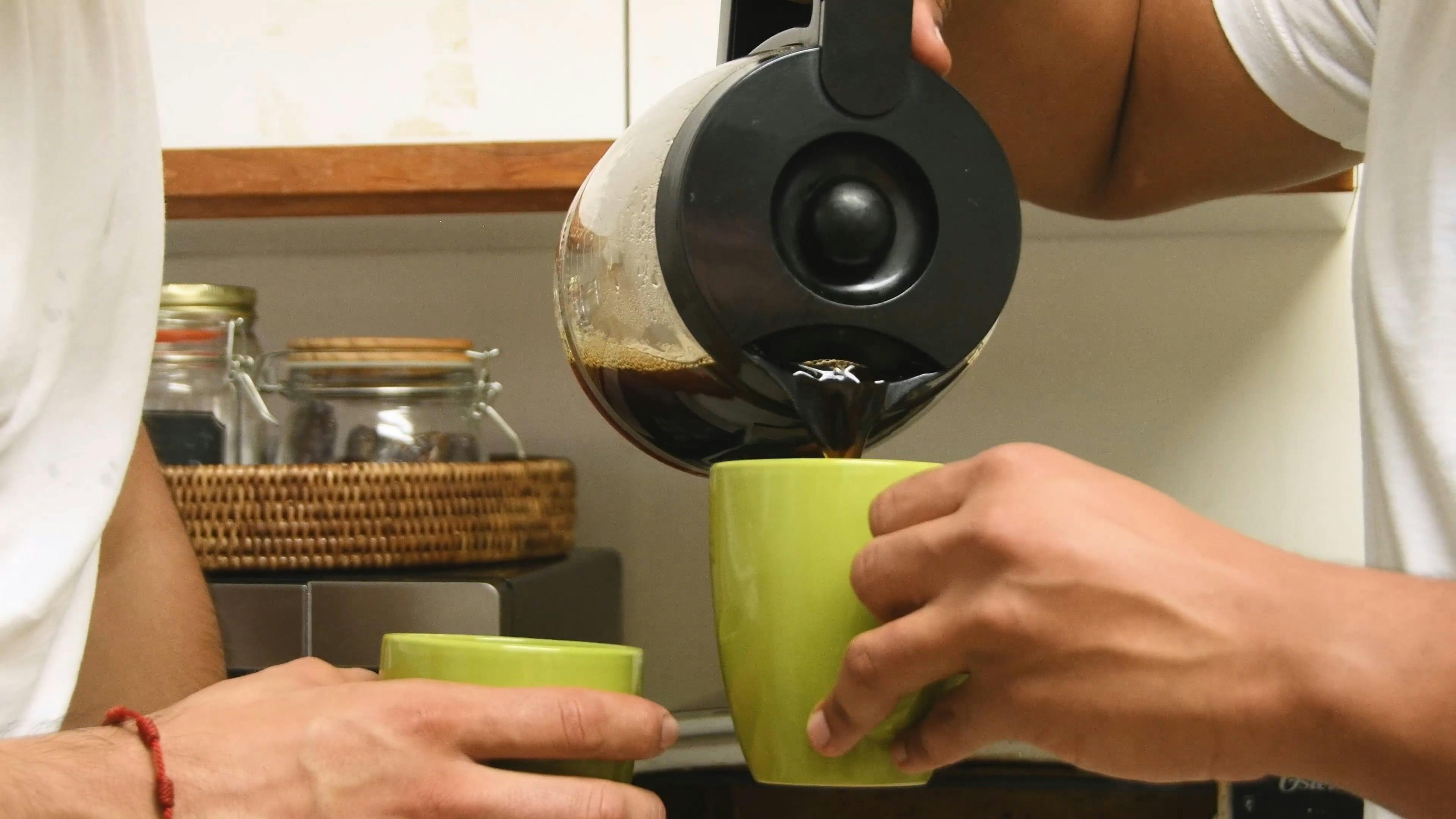 Close-Up Video Of Pouring Of Fresh Coffee On Cups Free Stock Video ...