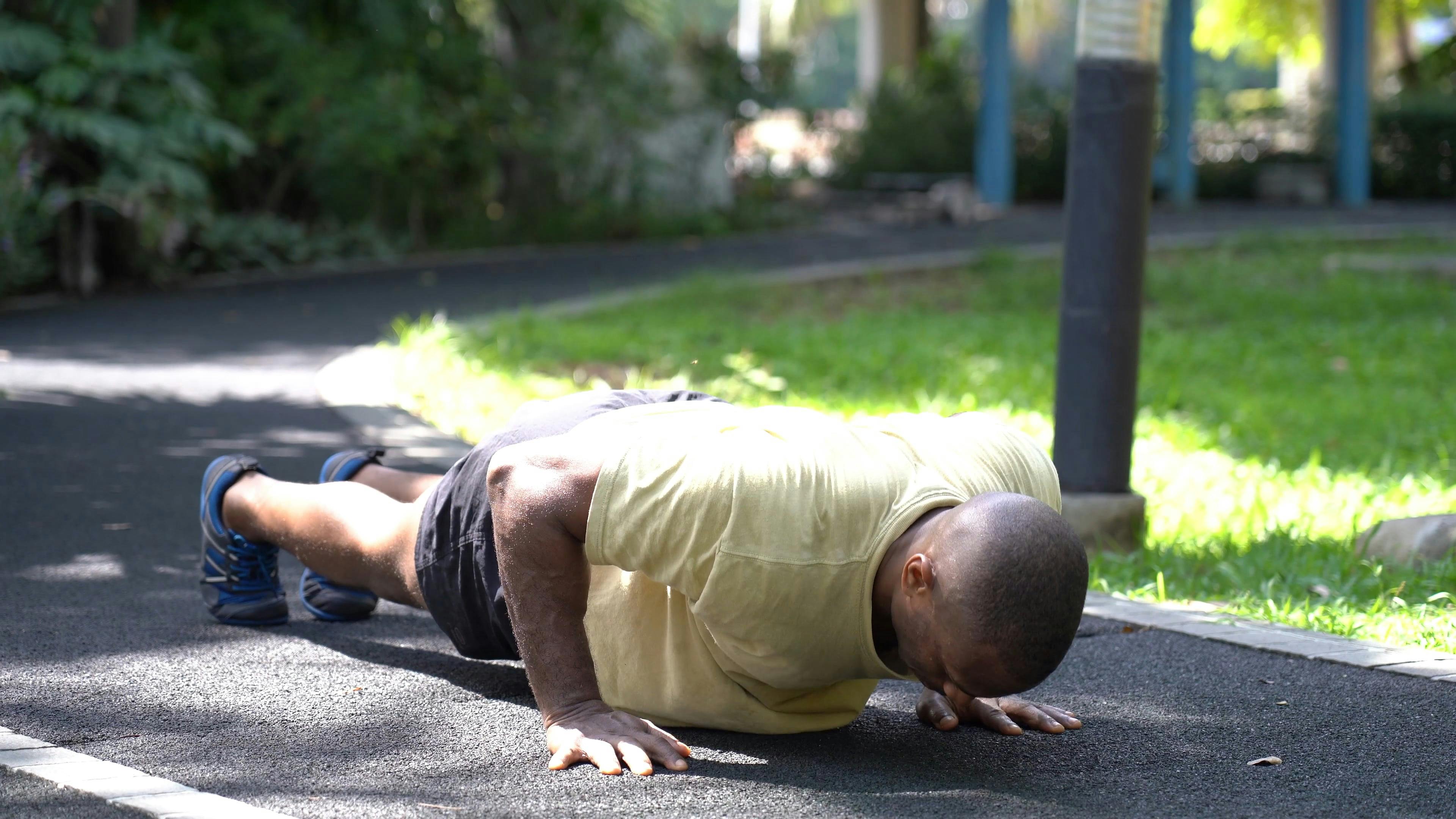 Video Of Man Doing Push-Ups On The Ground · Free Stock Video