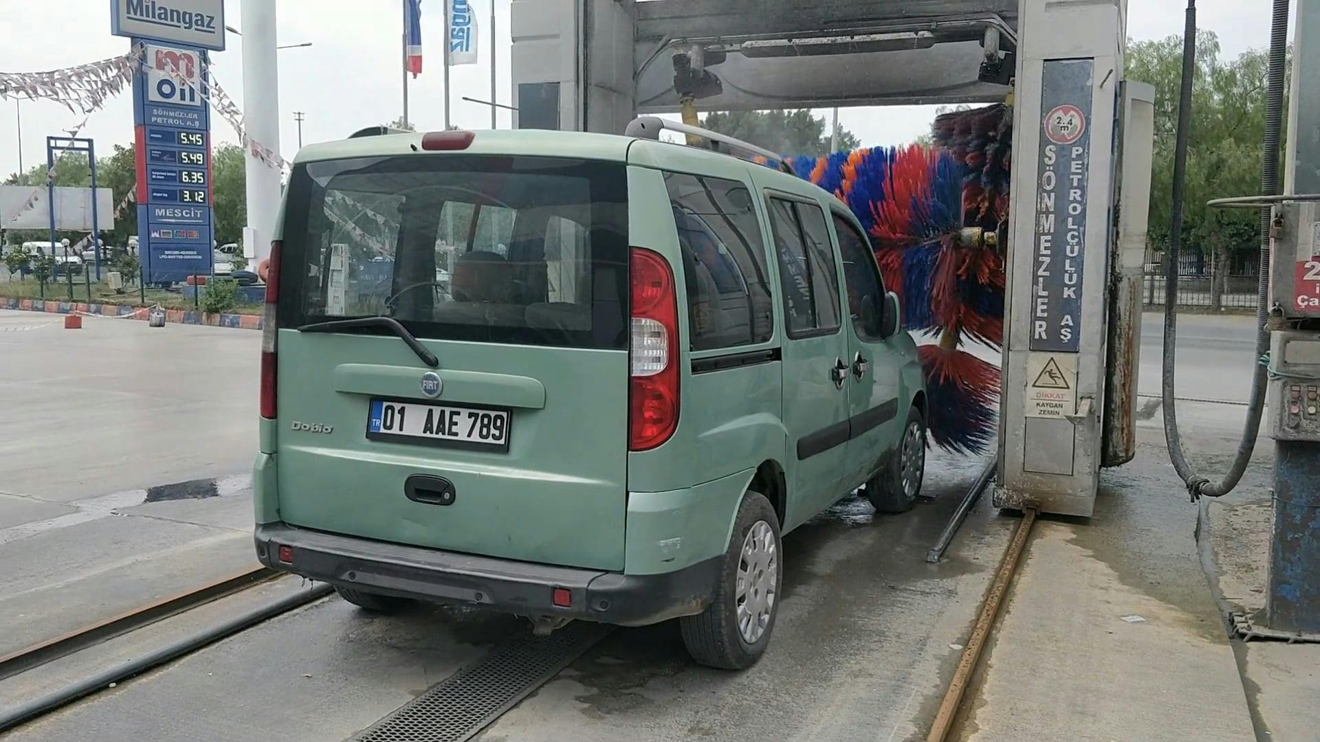 A Mini-van Going Through An Automated Car Wash · Free Stock Video