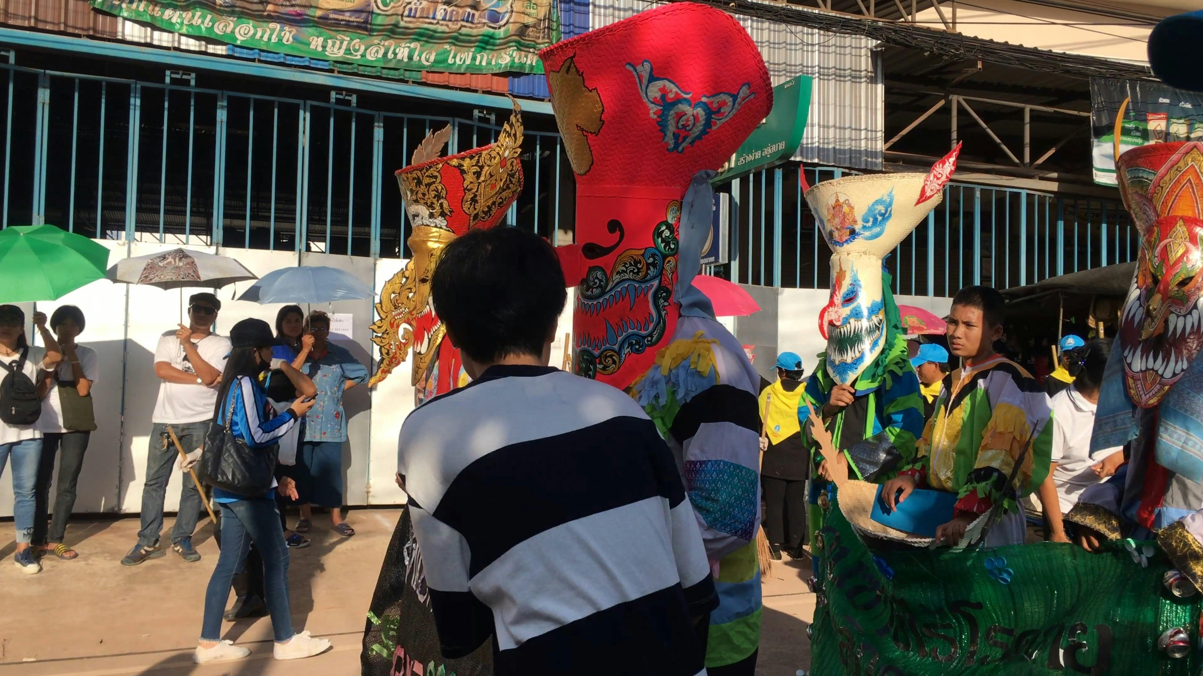 A Group Of Masked Participants Joining The Street Parade · Free Stock Video