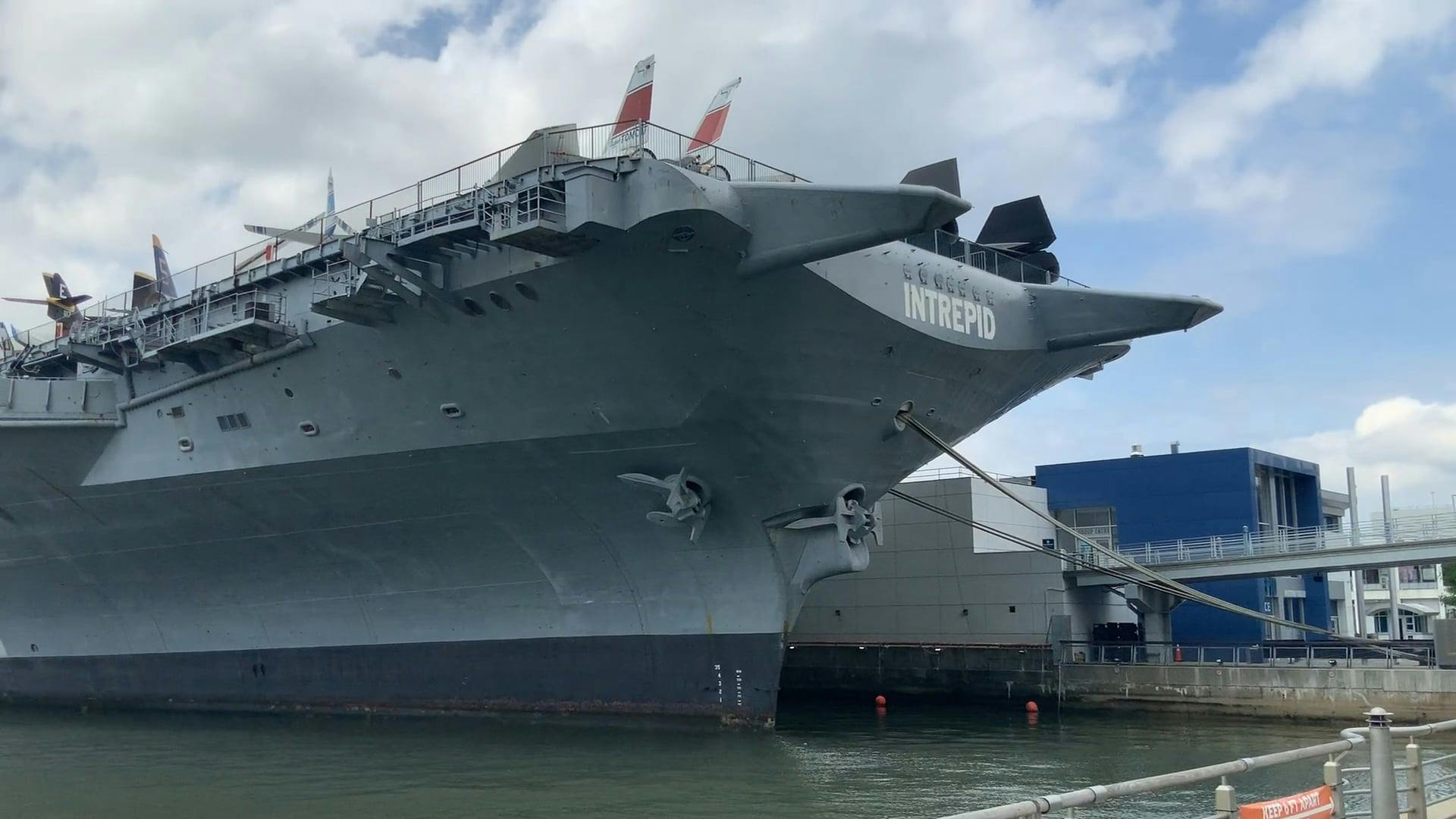 An Aircraft Carrier Docked In The Sea Bay · Free Stock Video