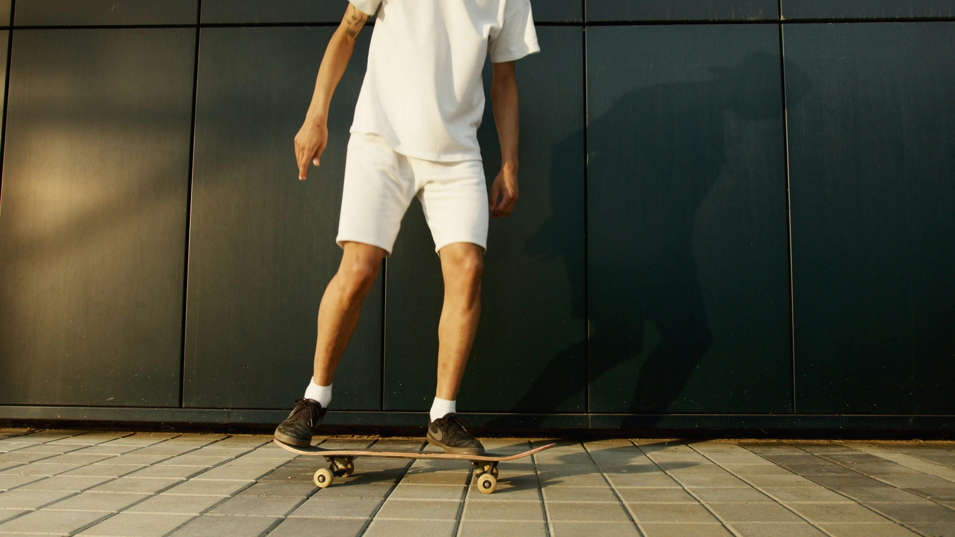 A Young Man Doing A Kick Flip Trick On A Skateboard · Free Stock Video