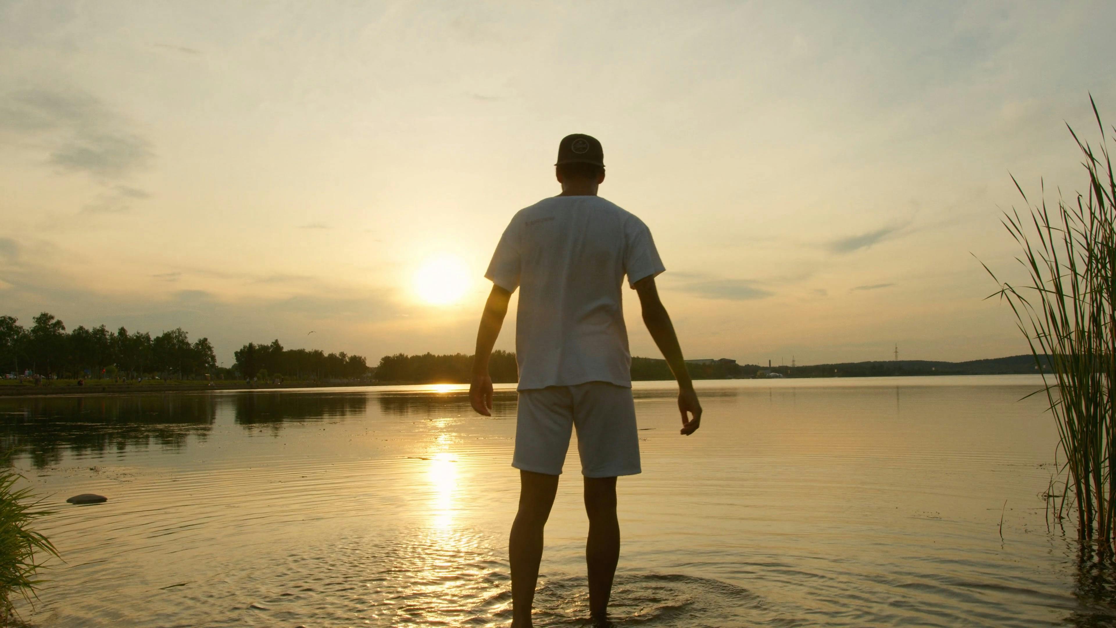 A Man Walking On The Lakeside Water Free Stock Video Footage, Royalty ...