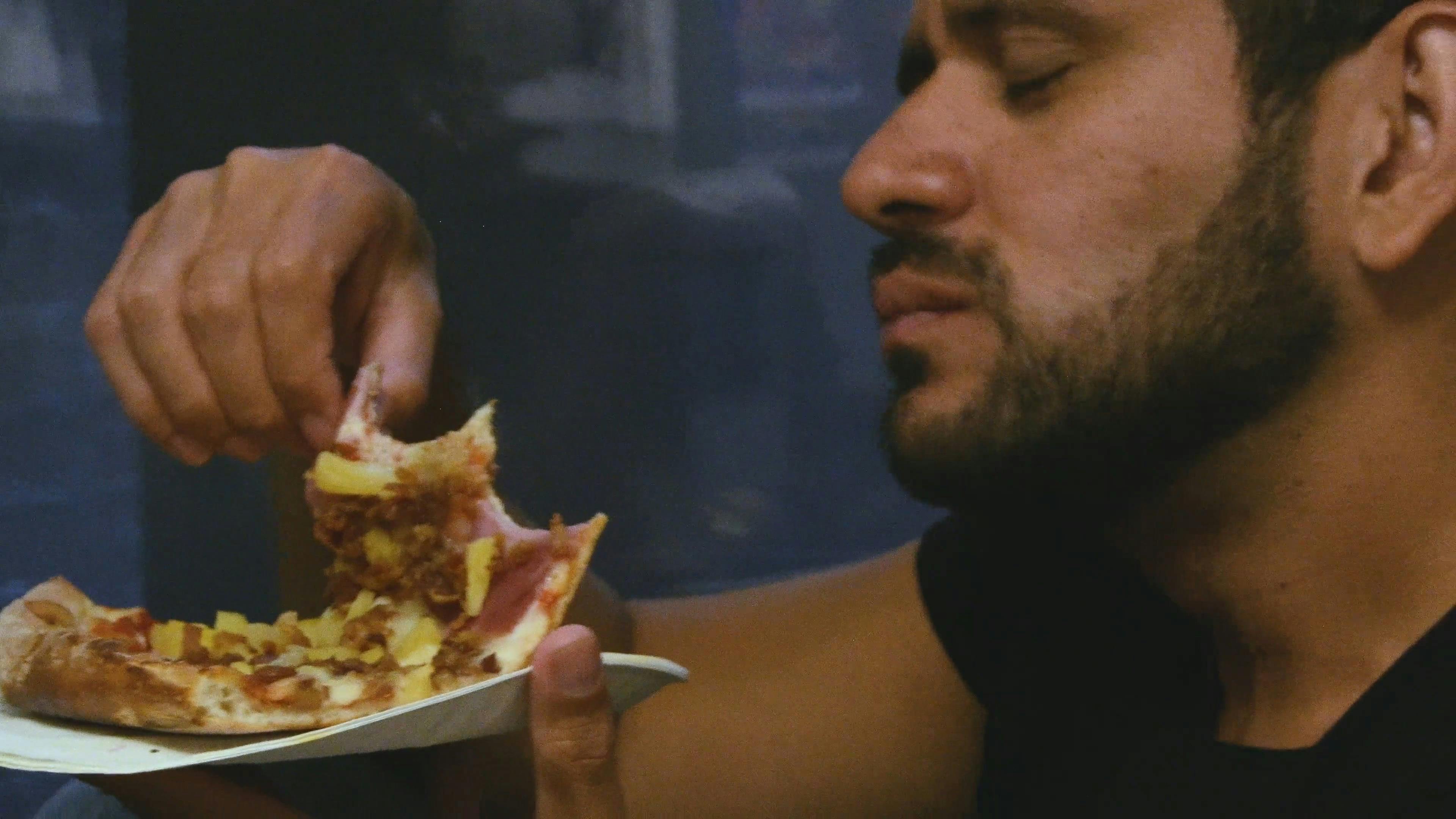 Man Eating a Pizza Free Stock Video Footage, Royalty-Free 4K & HD Video ...