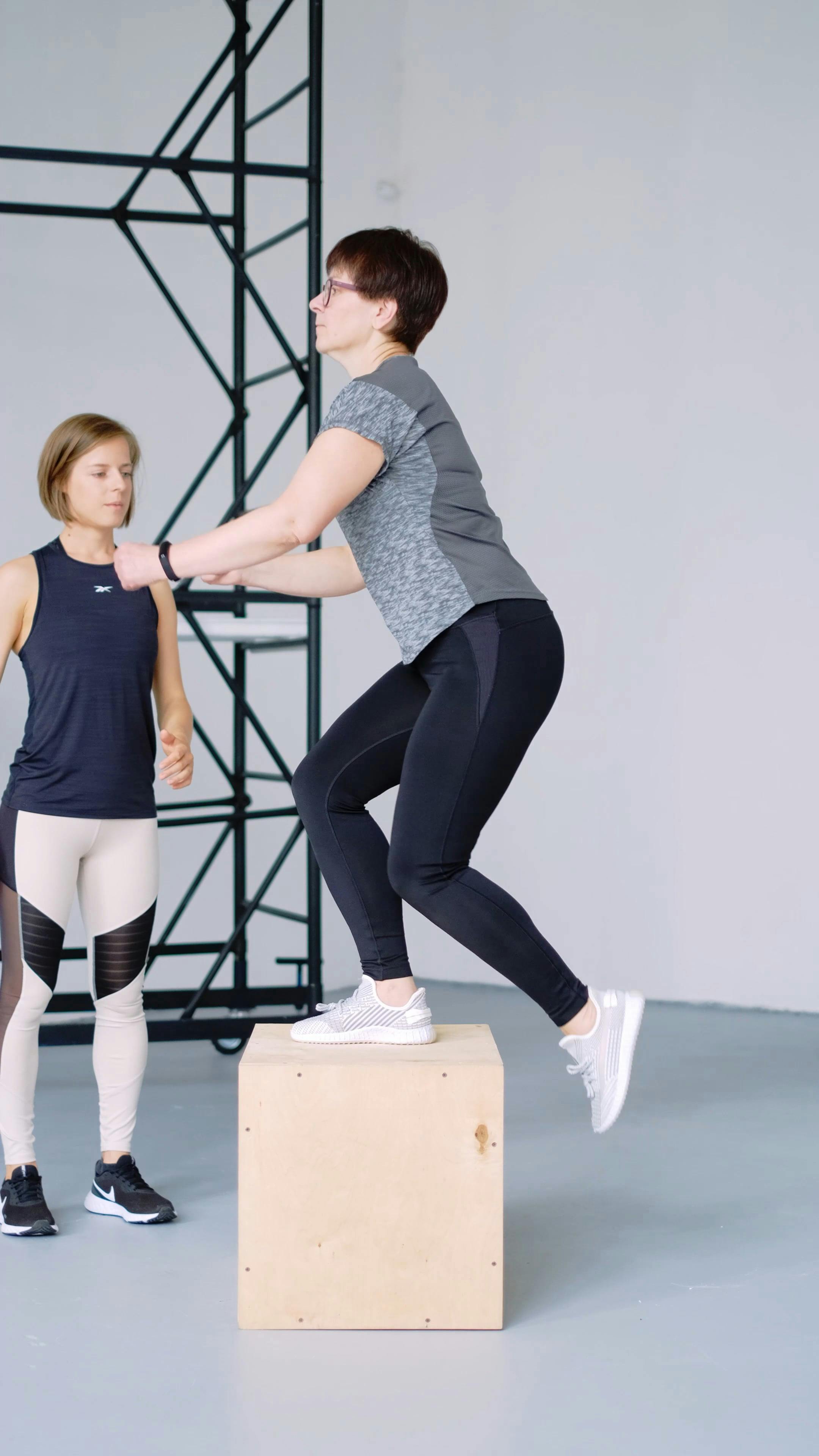 Trainer Explaining an Exercise to a Woman Free Stock Video Footage ...