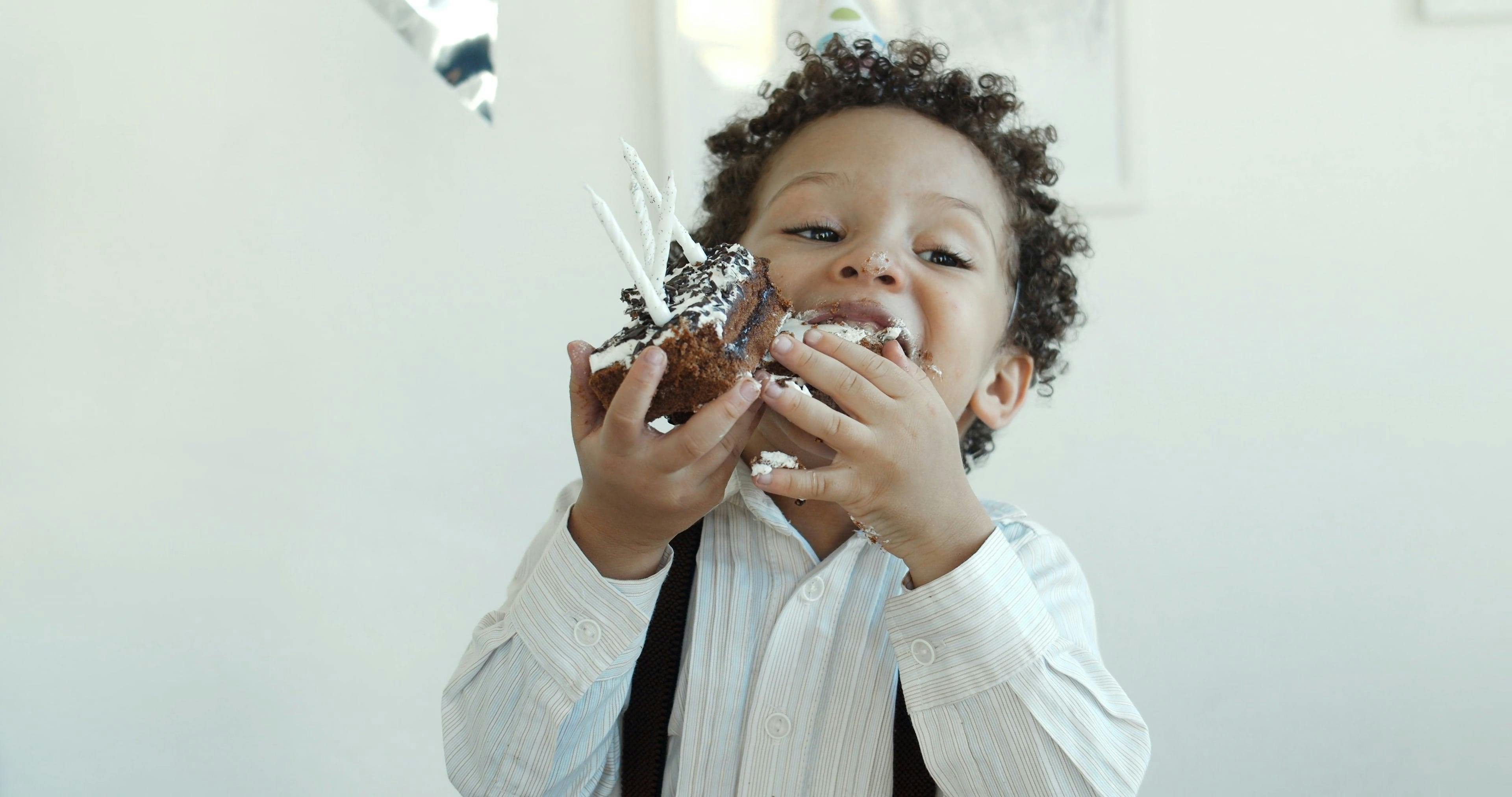 A Boy Eating a Cake Free Stock Video Footage, Royalty-Free 4K & HD ...