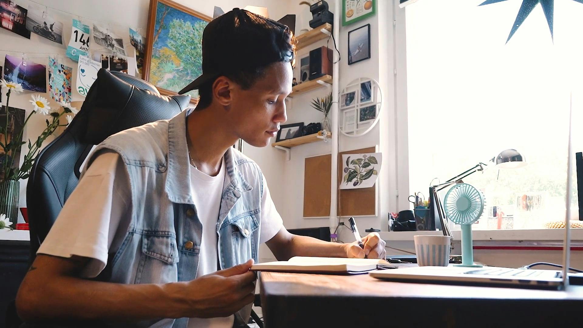 A Young Man Writing On A Notebook Free Stock Video Footage, Royalty ...