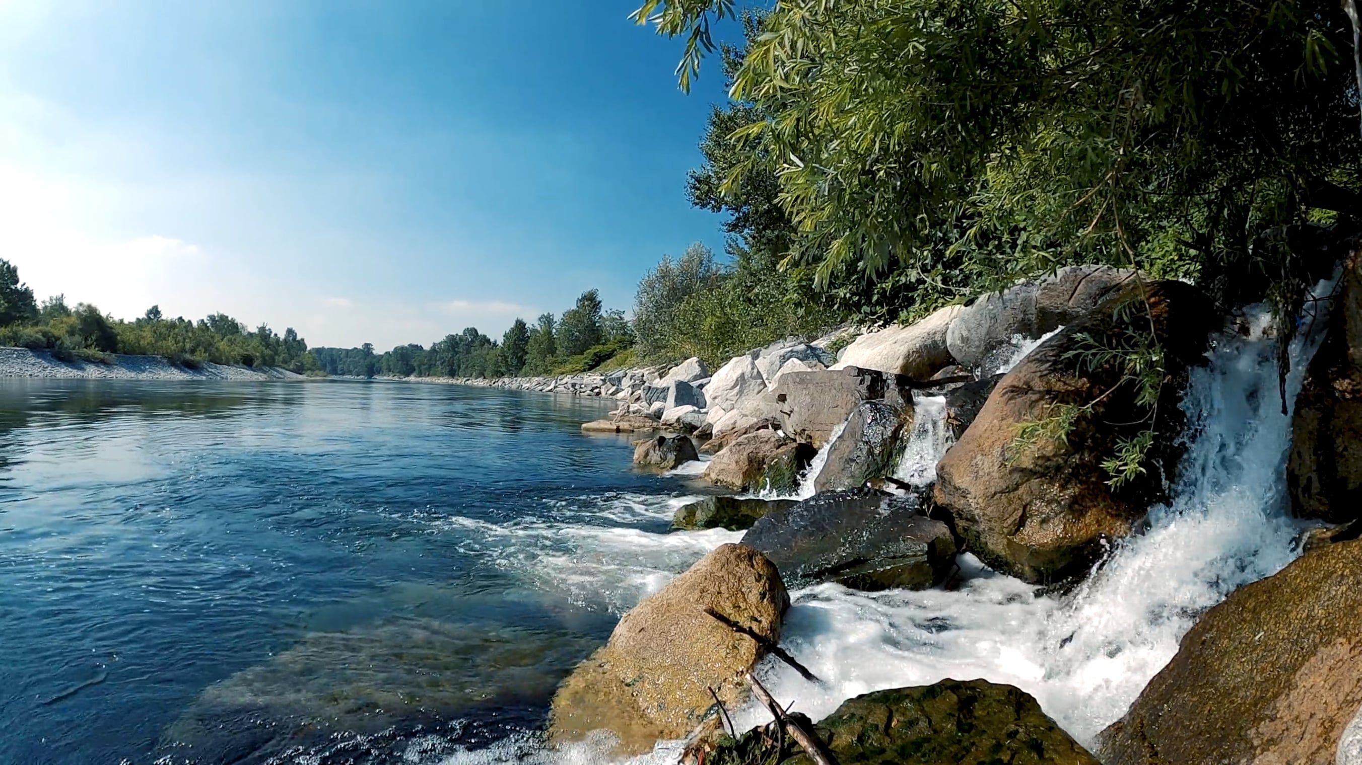 A Mini Waterfall Cascading Down To A River · Free Stock Video