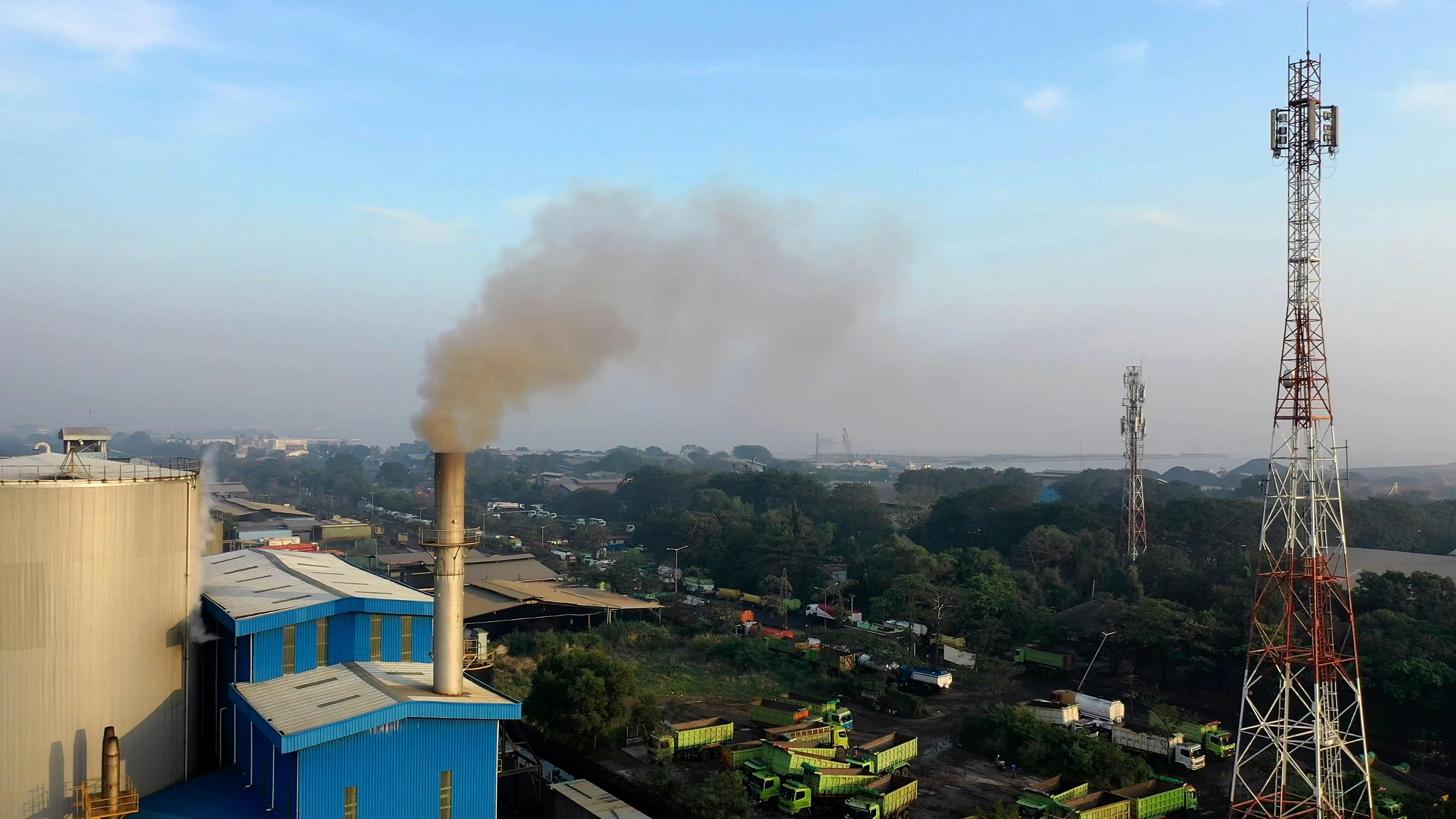 Smoke Coming Out Of A Manufacturing Plants's Chimney · Free Stock Video