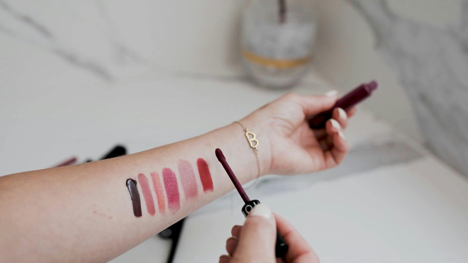 A Woman Brushing On Red Color Lipstick On Her Lips Free Stock Video ...