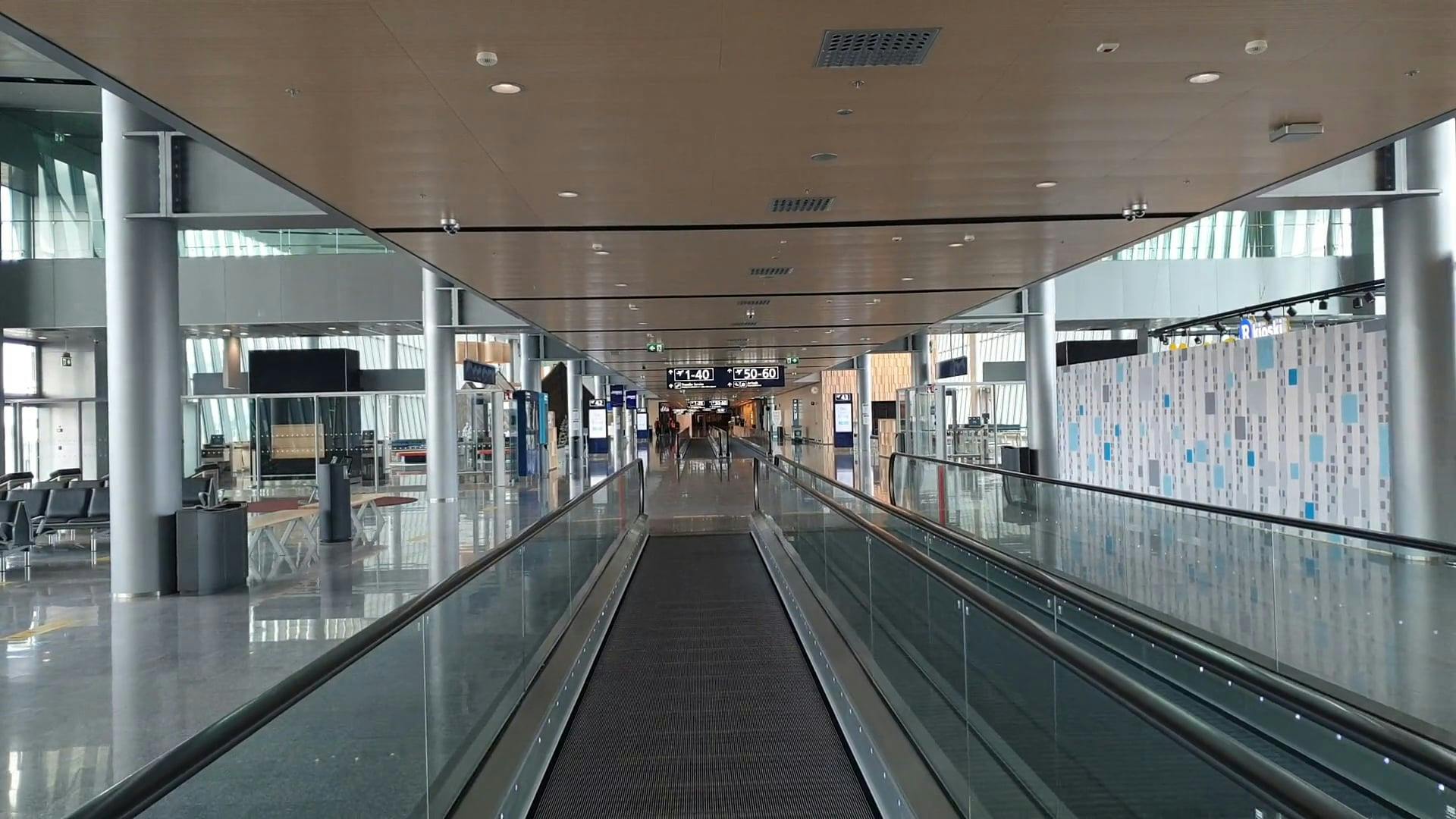 A Moving Walkway Inside An Airport · Free Stock Video
