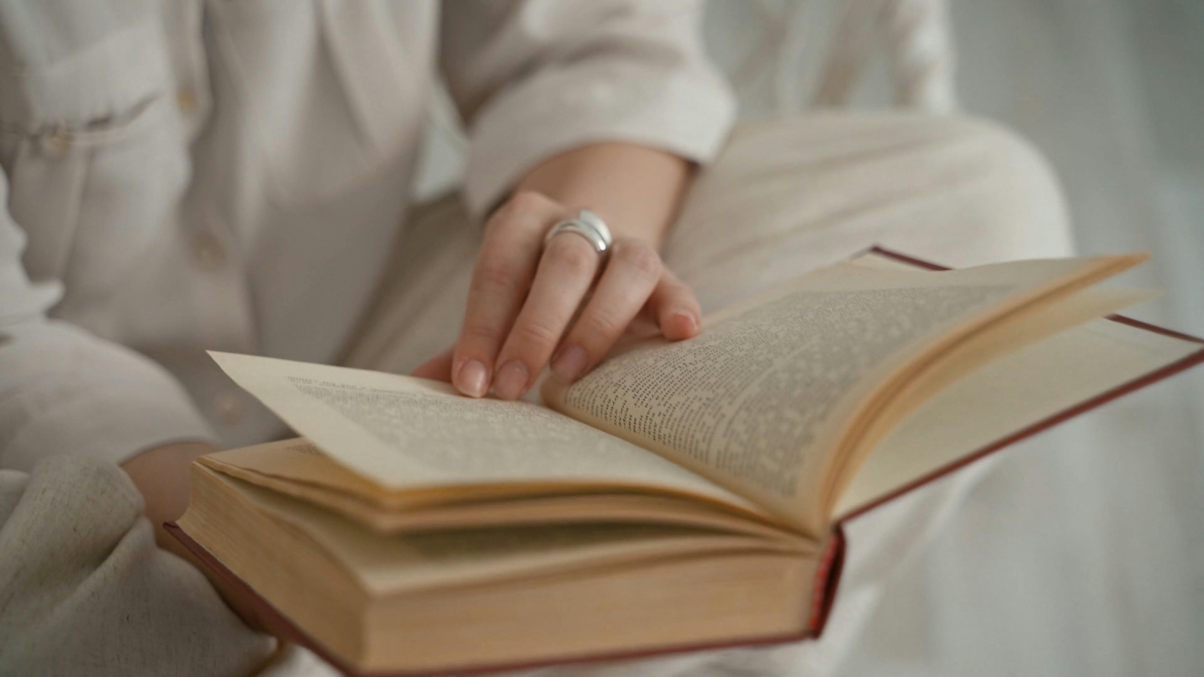 Person Reading a Book · Free Stock Video