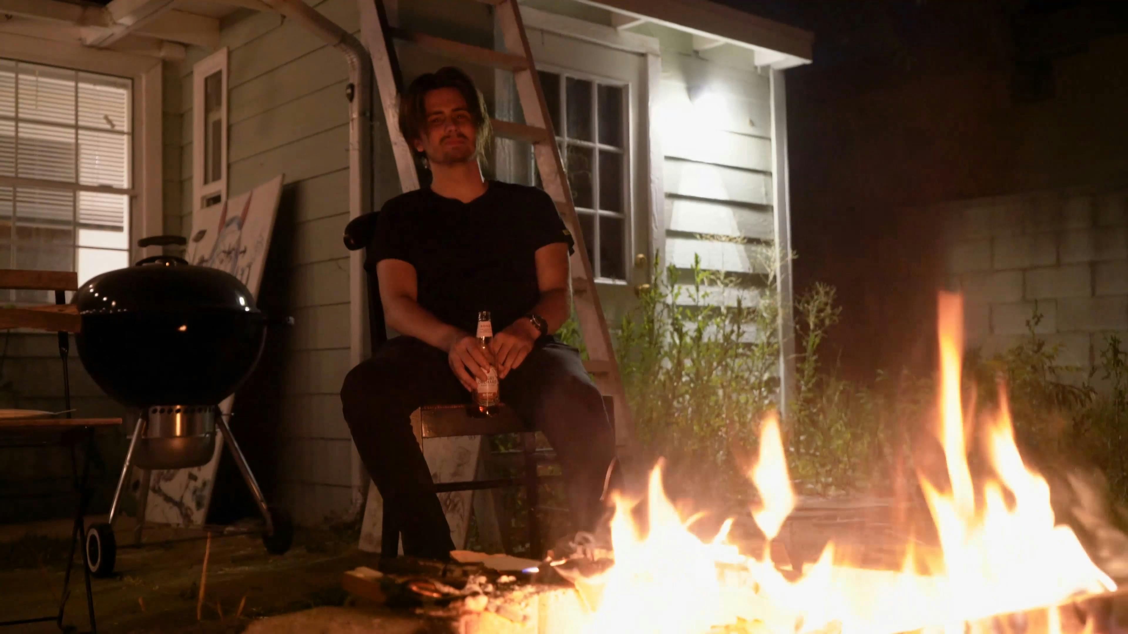 A Man Drinking Beer by the Fire Pit Free Stock Video Footage, Royalty ...