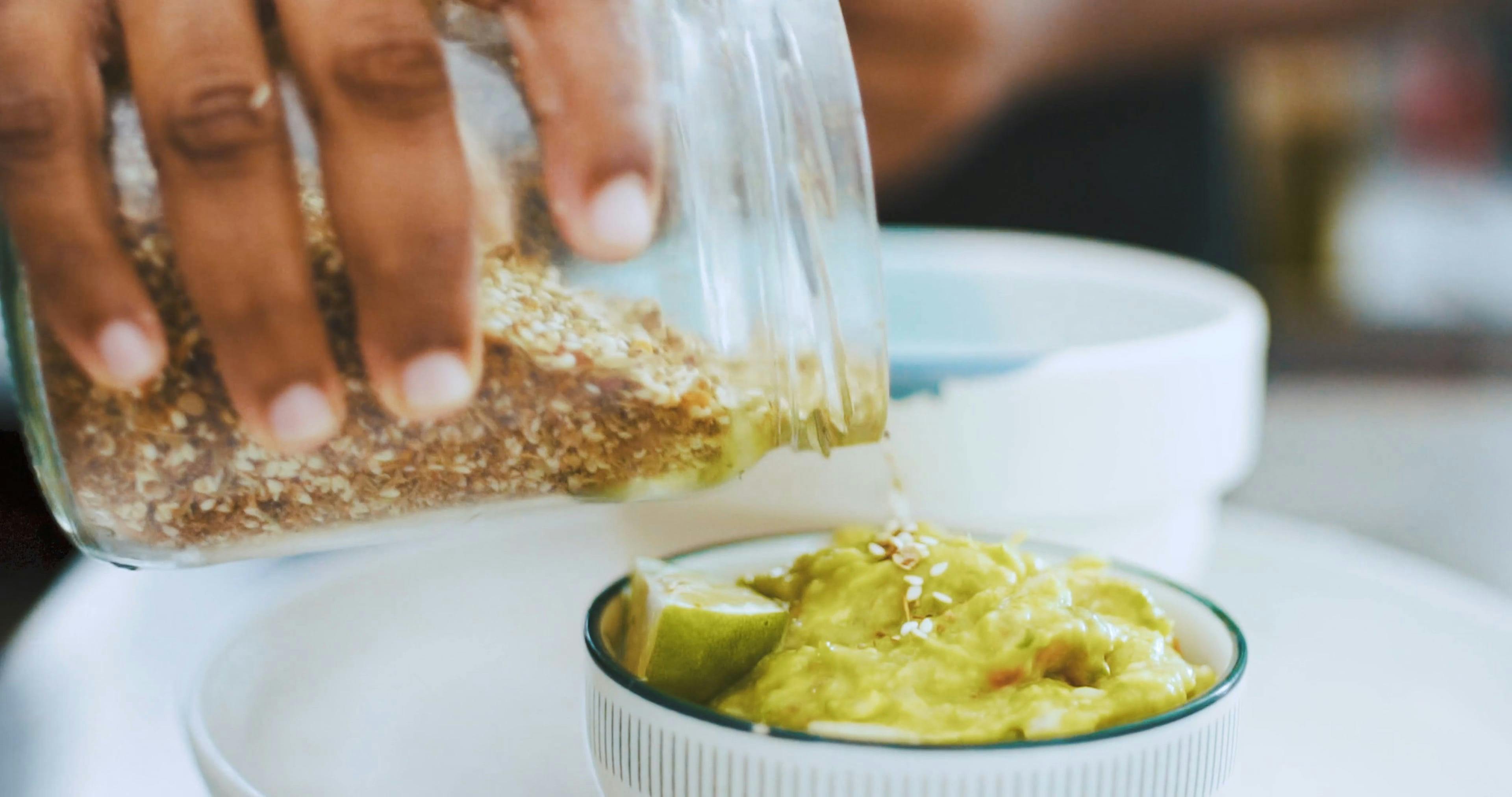 Close-Up View of a Person Adding Spices Free Stock Video Footage ...