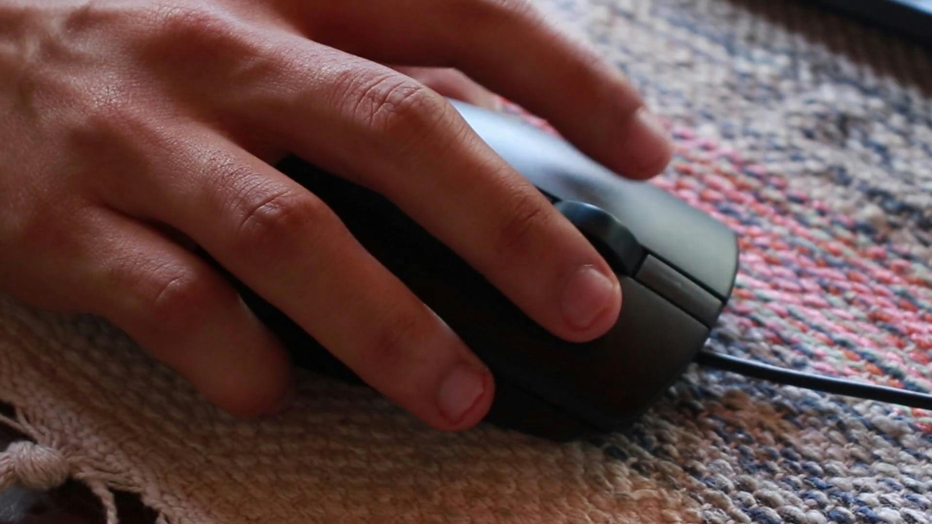 Close-Up View of a Person Using a Mouse · Free Stock Video