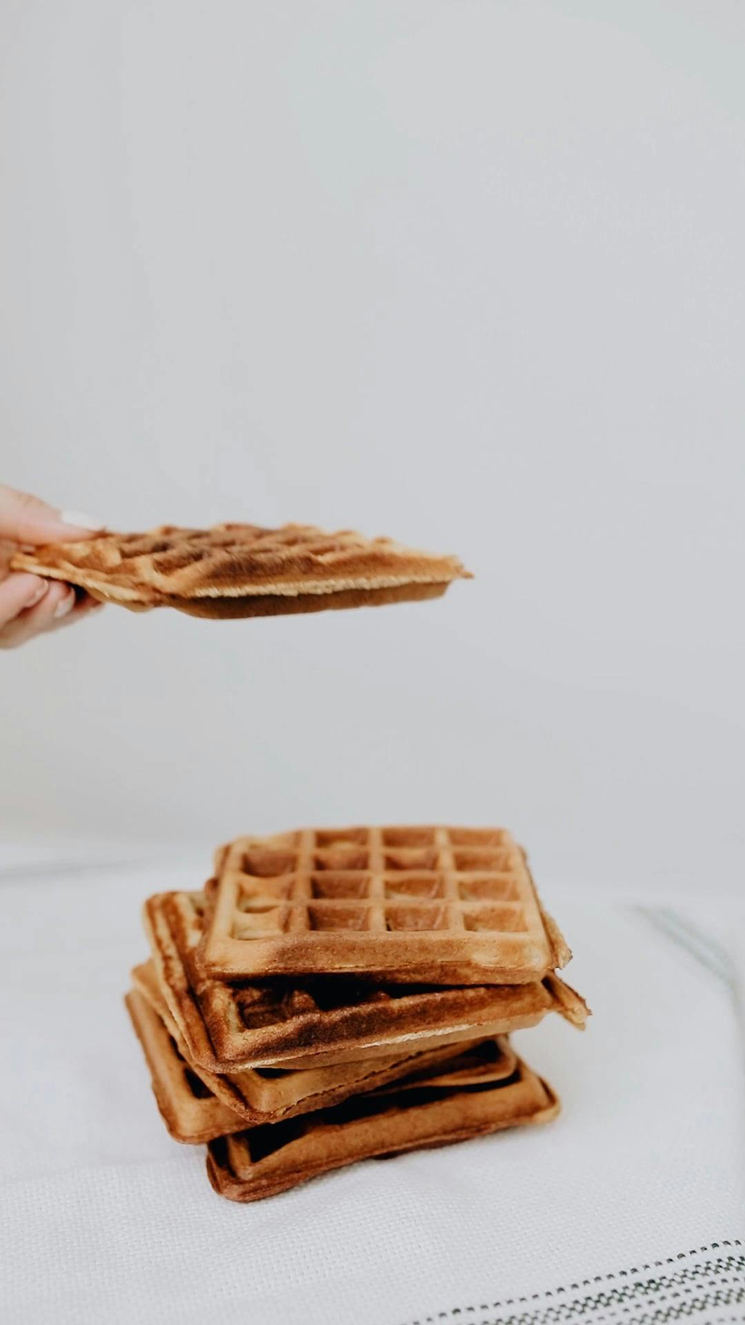 Stack of Waffles on a Plate with Strawberries and Cream on Top · Free ...