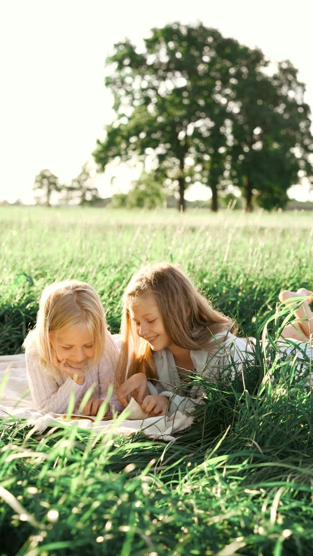 Sister Reading a Book Together Free Stock Video Footage, Royalty-Free ...