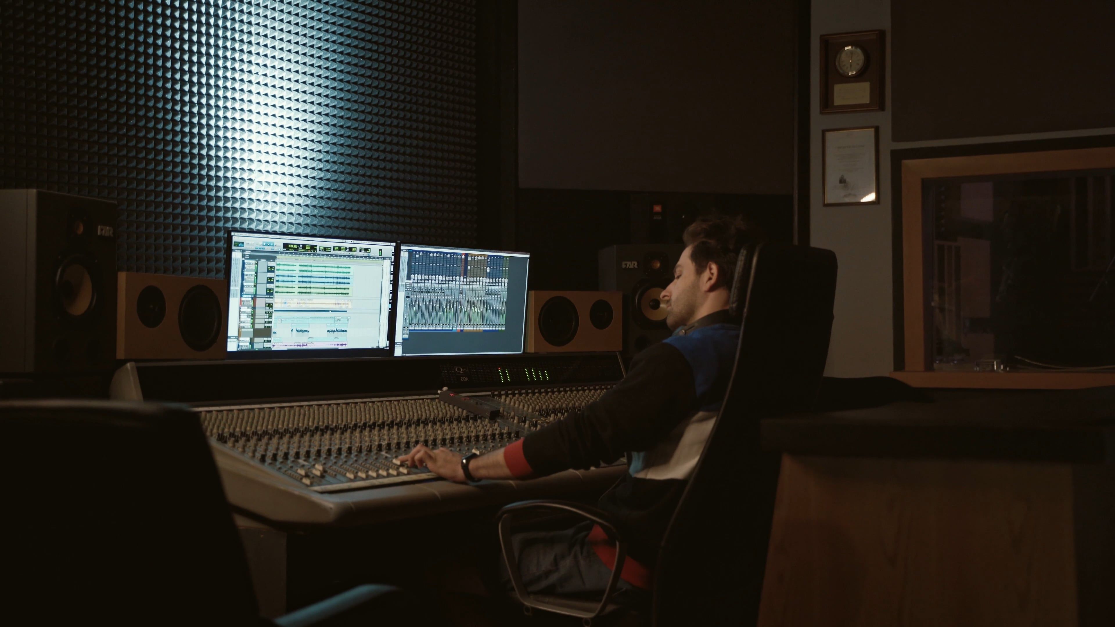 A Man Sitting Inside the Recording Studio Free Stock Video Footage ...