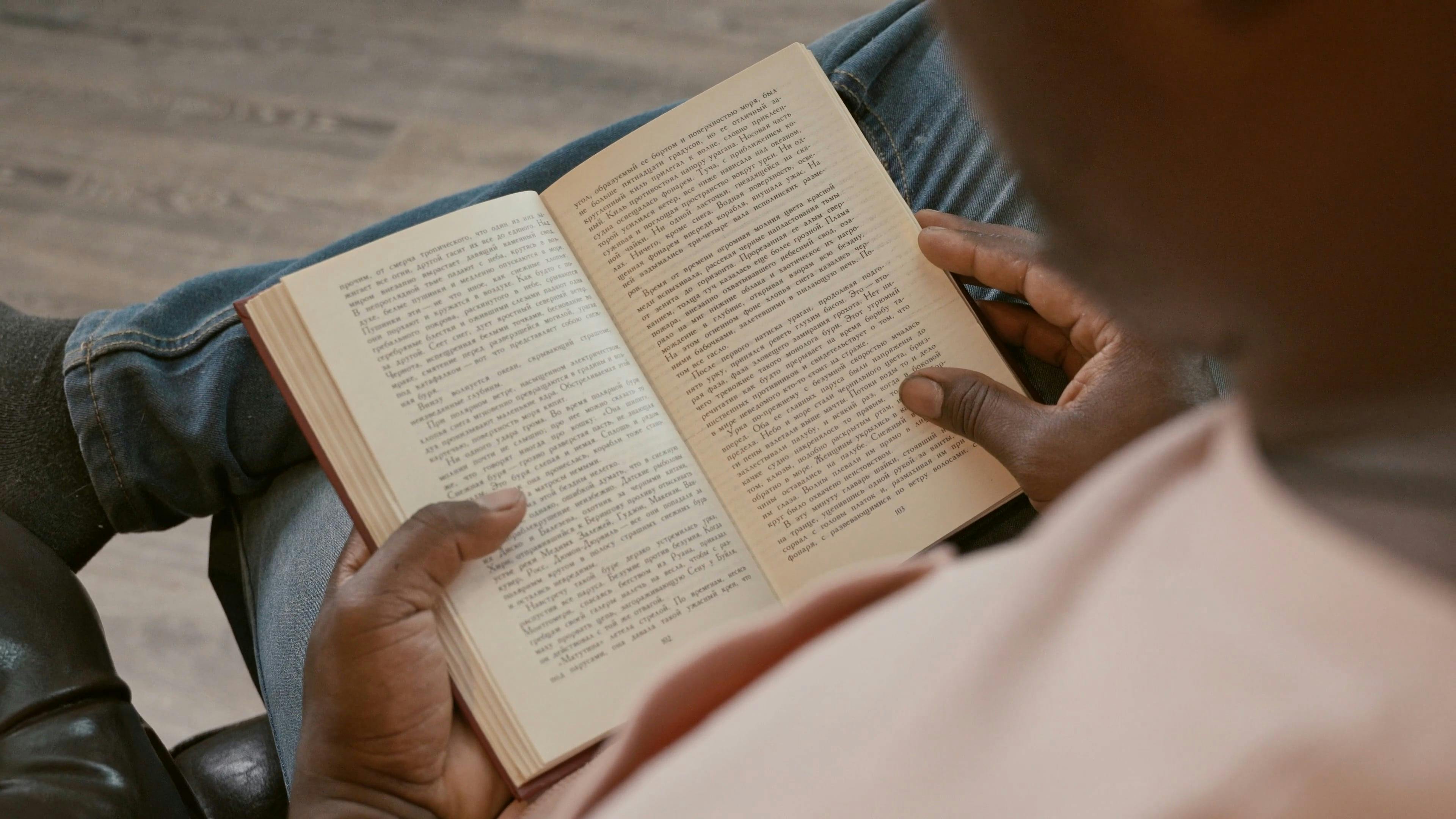 Person Reading a Book · Free Stock Video