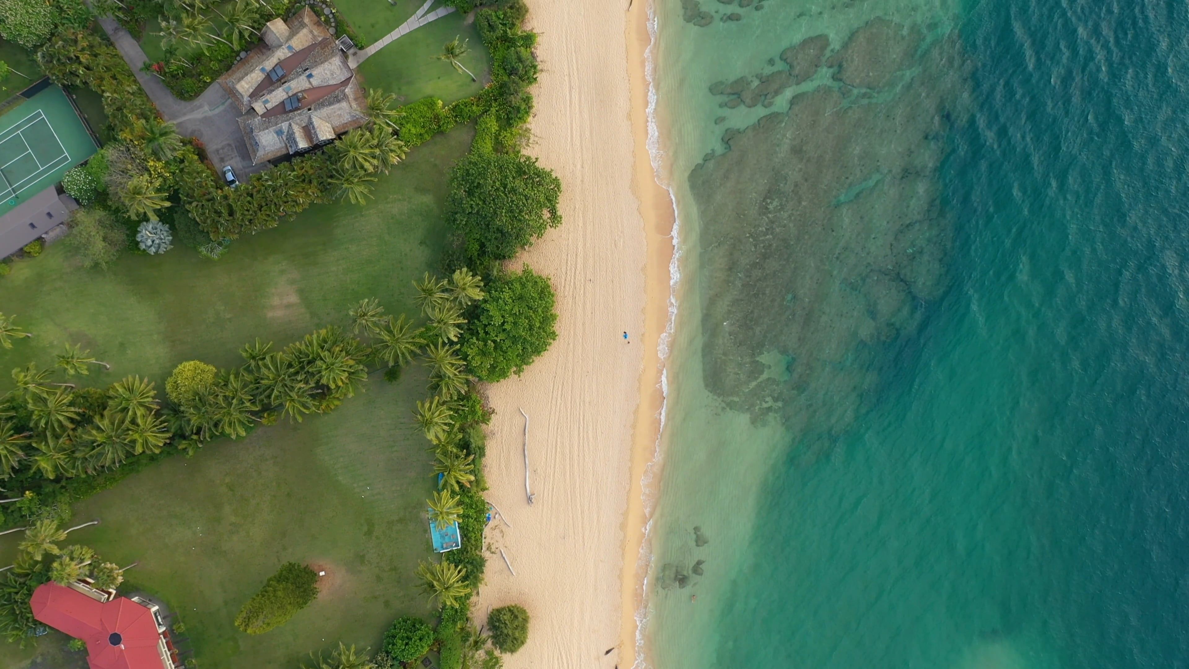 An aerial view of a beach and house Free Stock Video Footage, Royalty ...