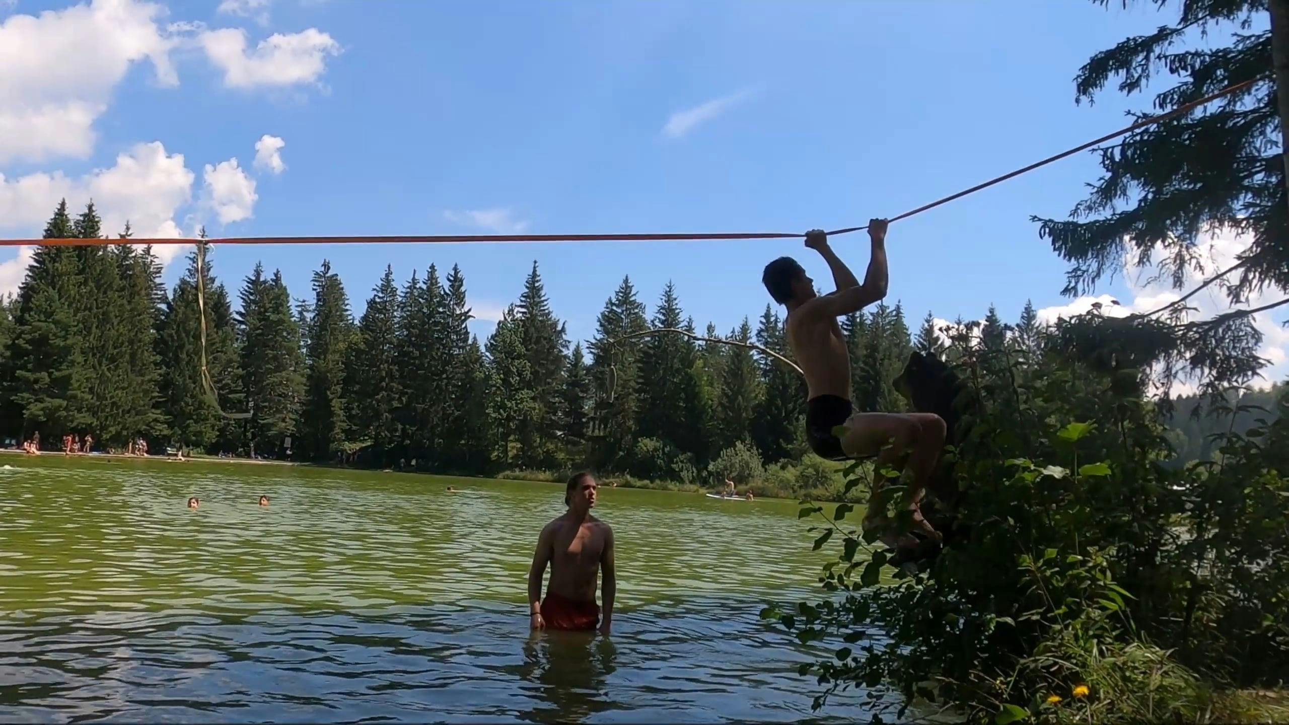Men Balancing on a Tightrope · Free Stock Video
