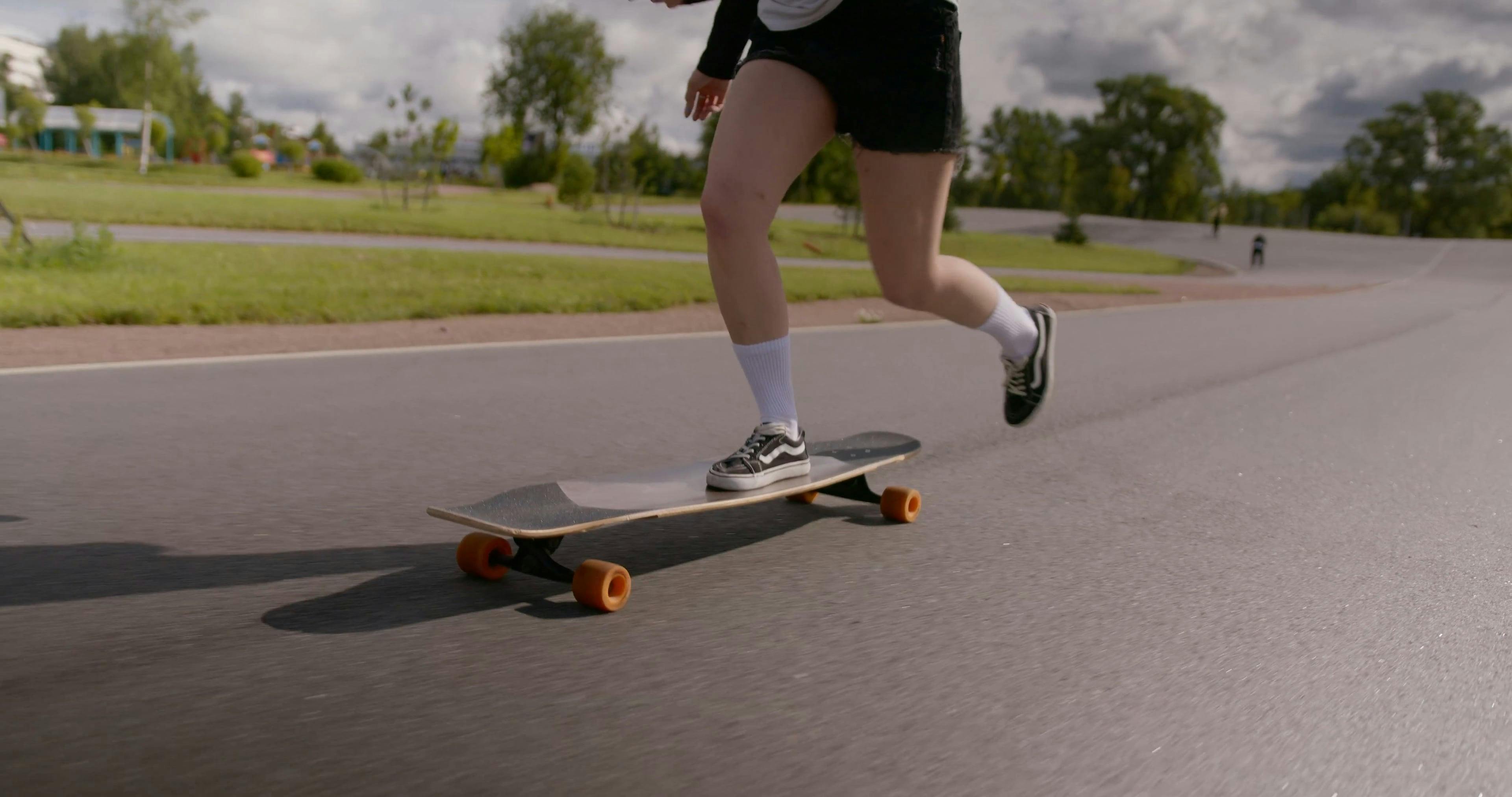Girl Riding a Longboard Outdoors Free Stock Video Footage, Royalty-Free ...