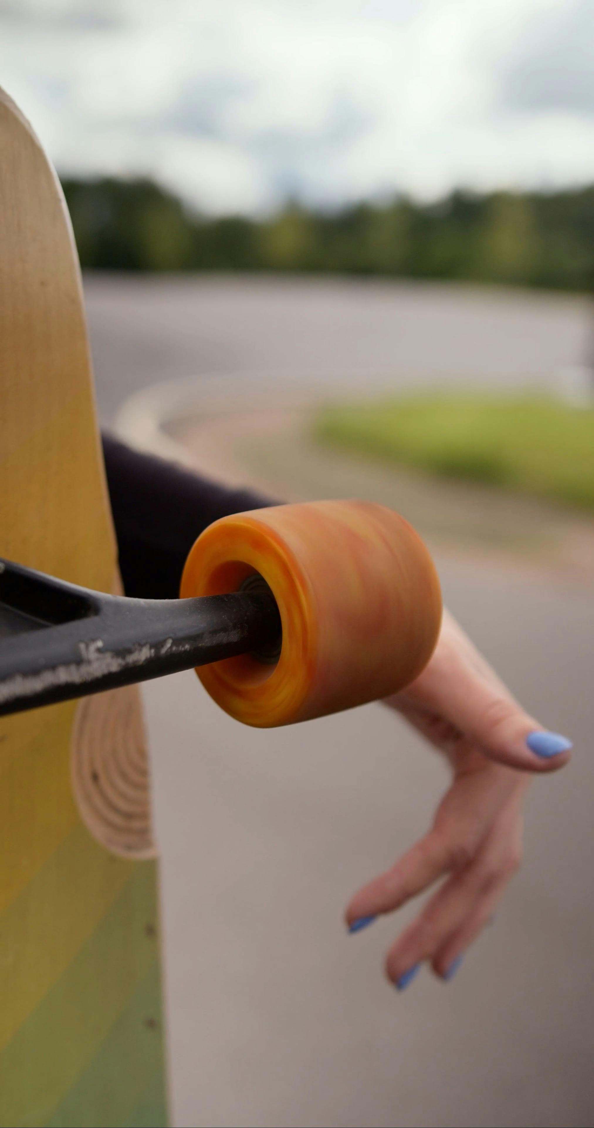 Person Spinning Her Longboard Wheel Free Stock Video Footage, Royalty ...