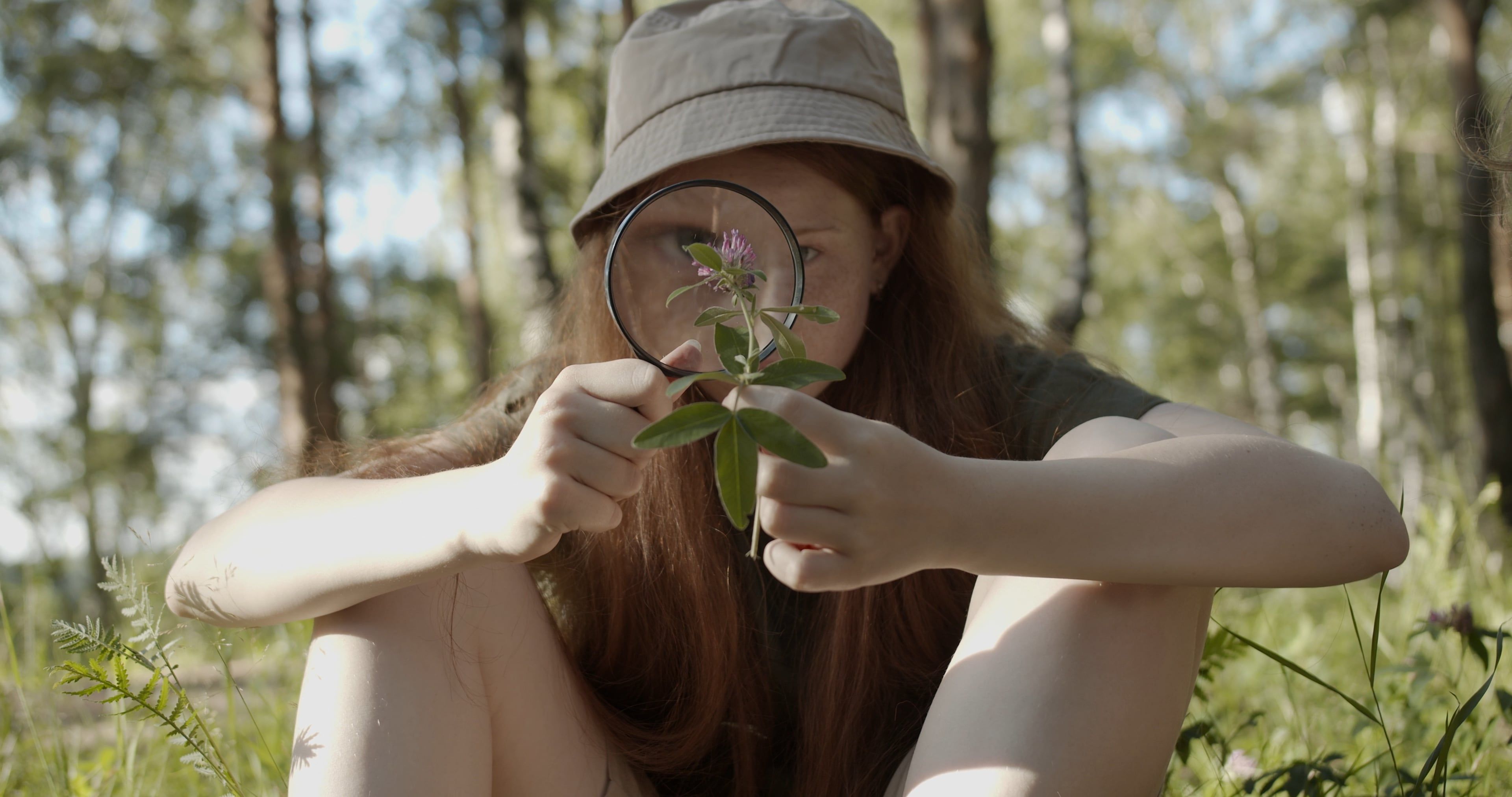 Young Woman Looking at the Flower · Free Stock Video