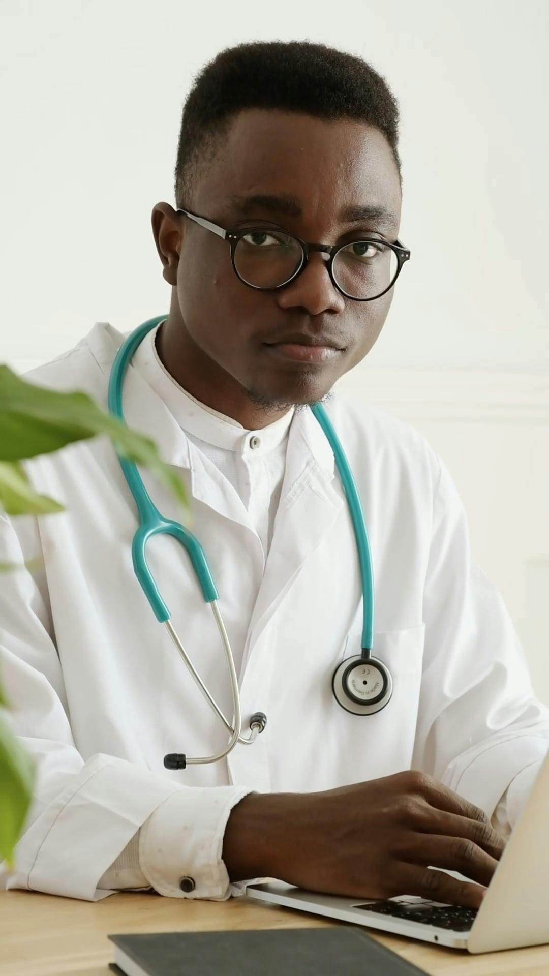 Man in White Lab Coat Smiling · Free Stock Video