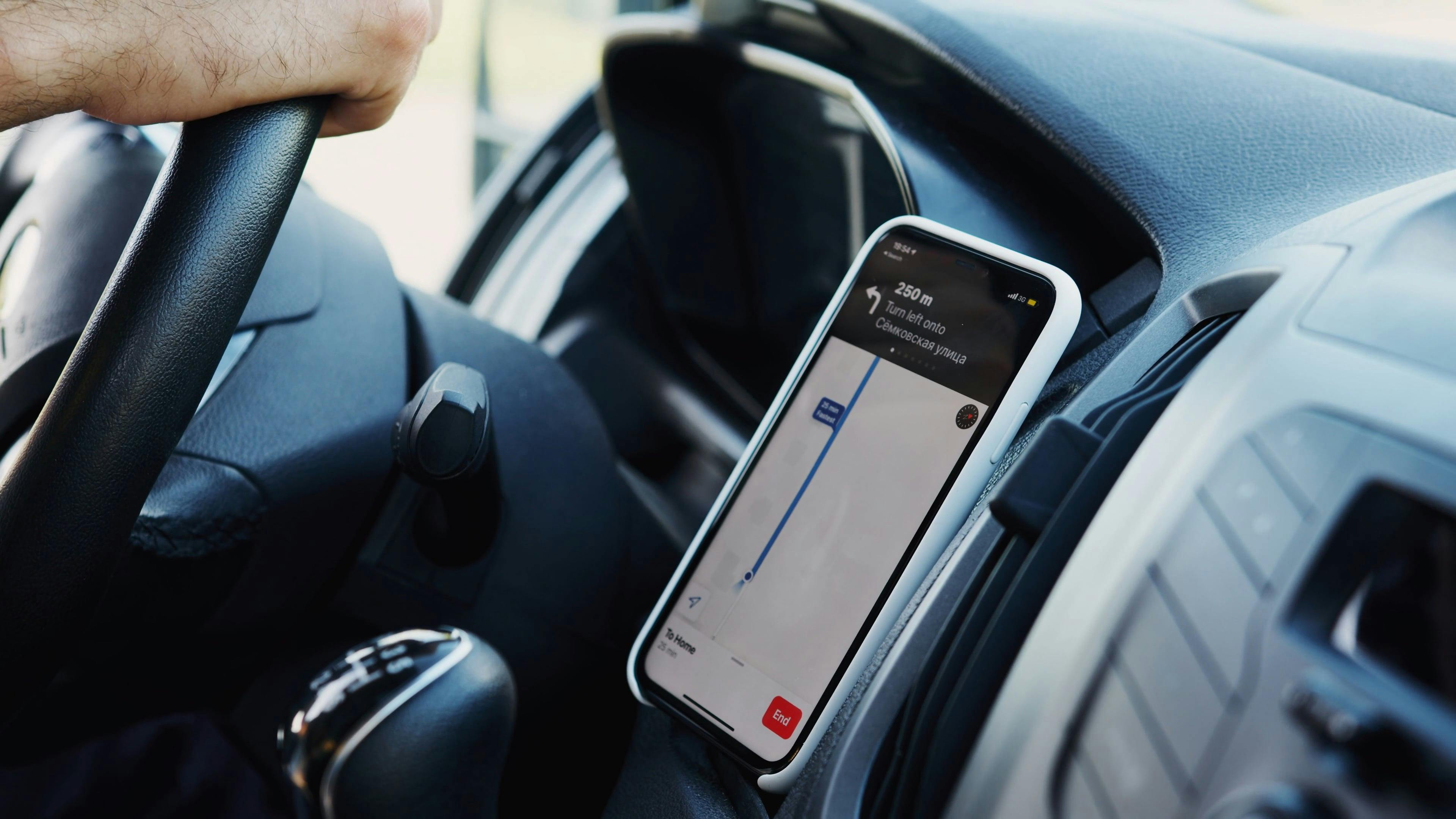 Person Driving Using GPS Navigation System On A Smartphone · Free Stock ...