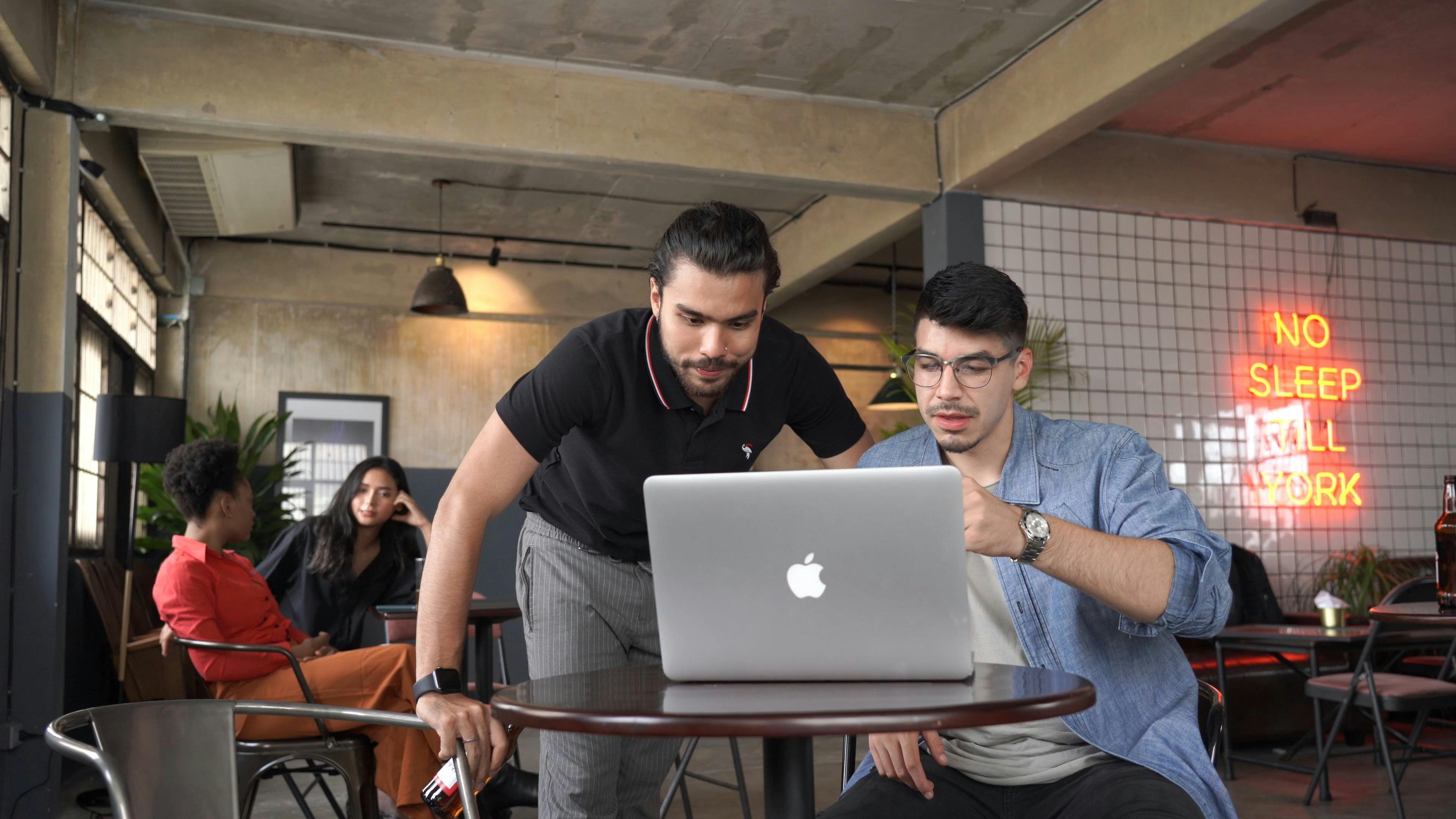 Two Men Talking while Looking at a Laptop Free Stock Video Footage ...