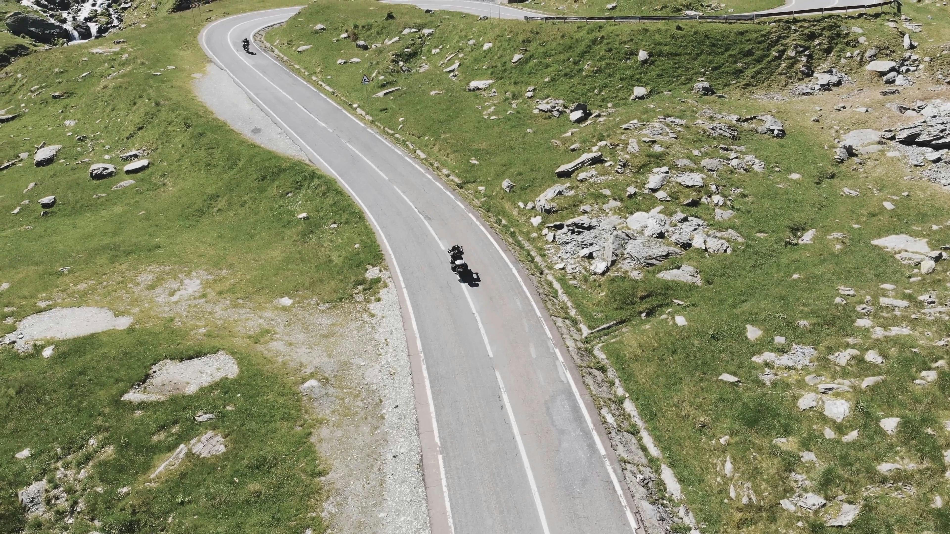 Aerial Shot of Motorcycle Cruising on Mountains · Free Stock Video