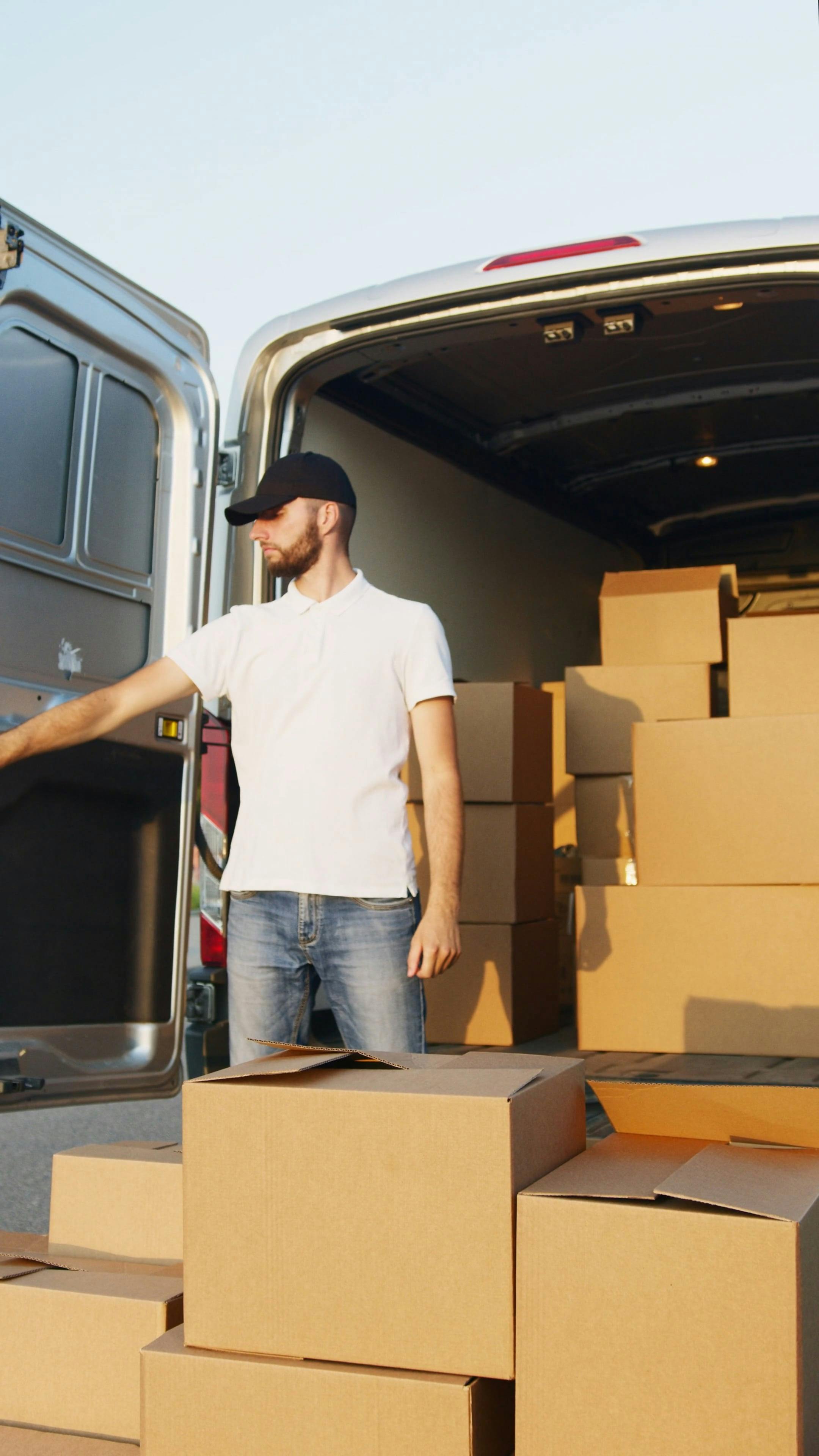 Video Of Delivery Man Carrying Boxes Of Goods · Free Stock Video