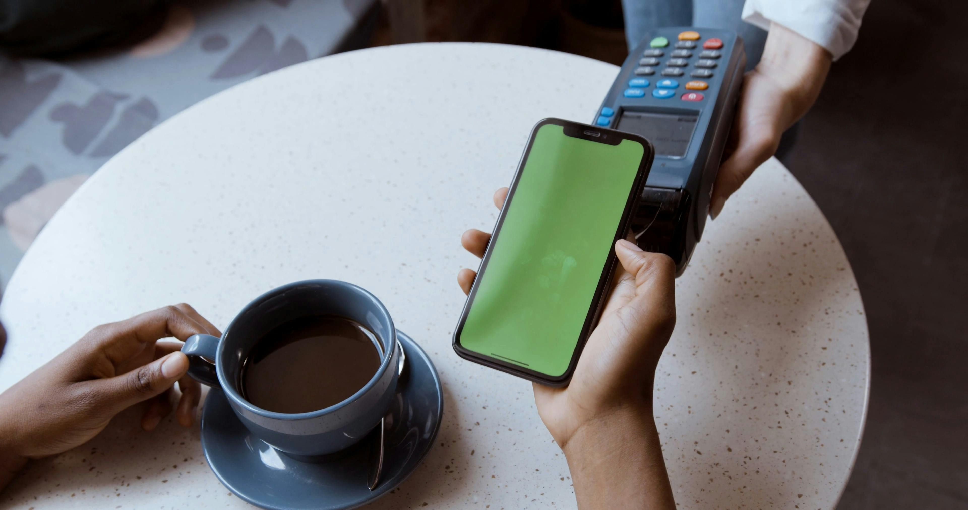 Person Holding Mobile Phone While Writing On Notebook Free Stock Video ...