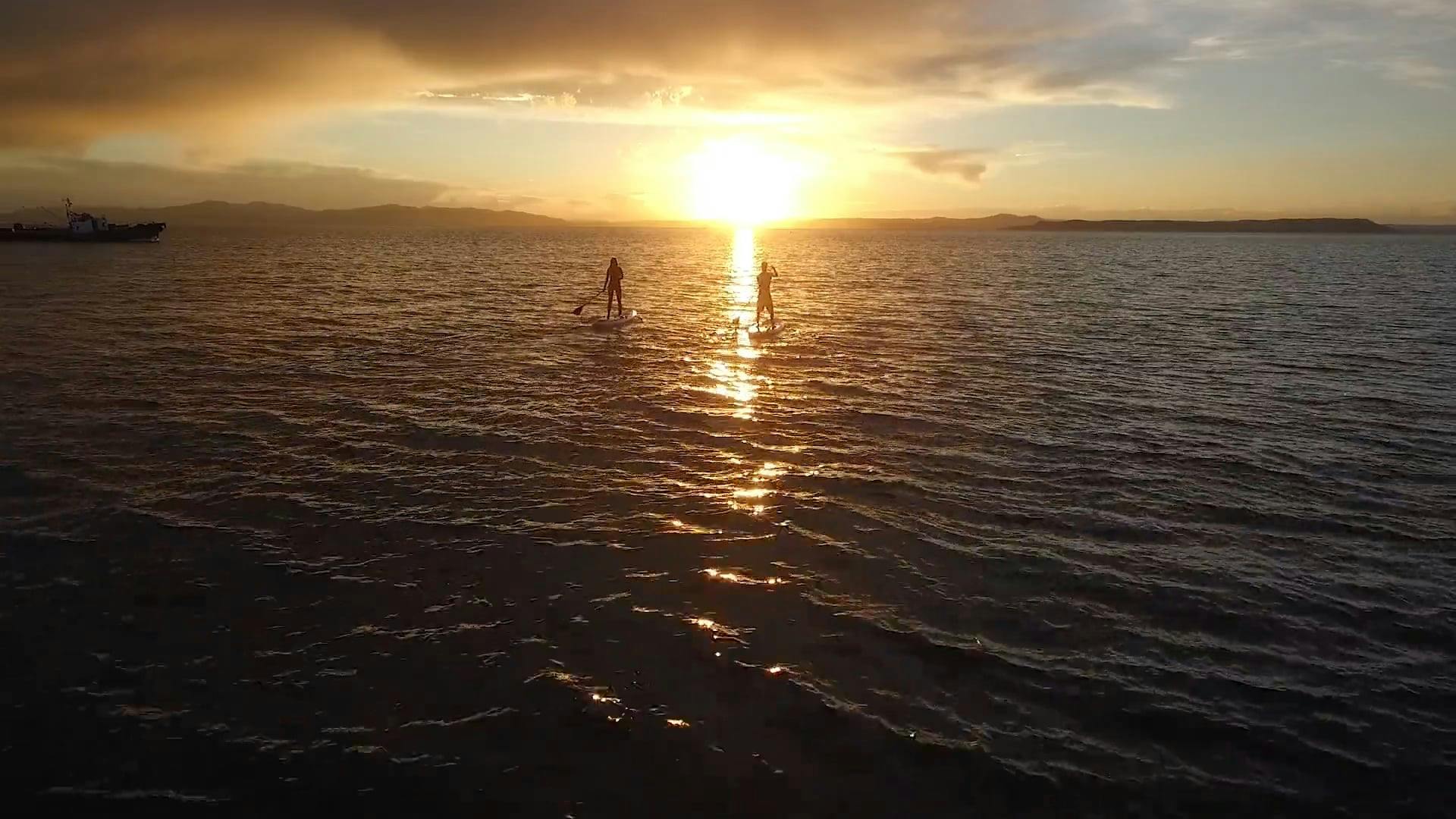 Evening Shot of Two People Rowing in the Sea Free Stock Video Footage ...