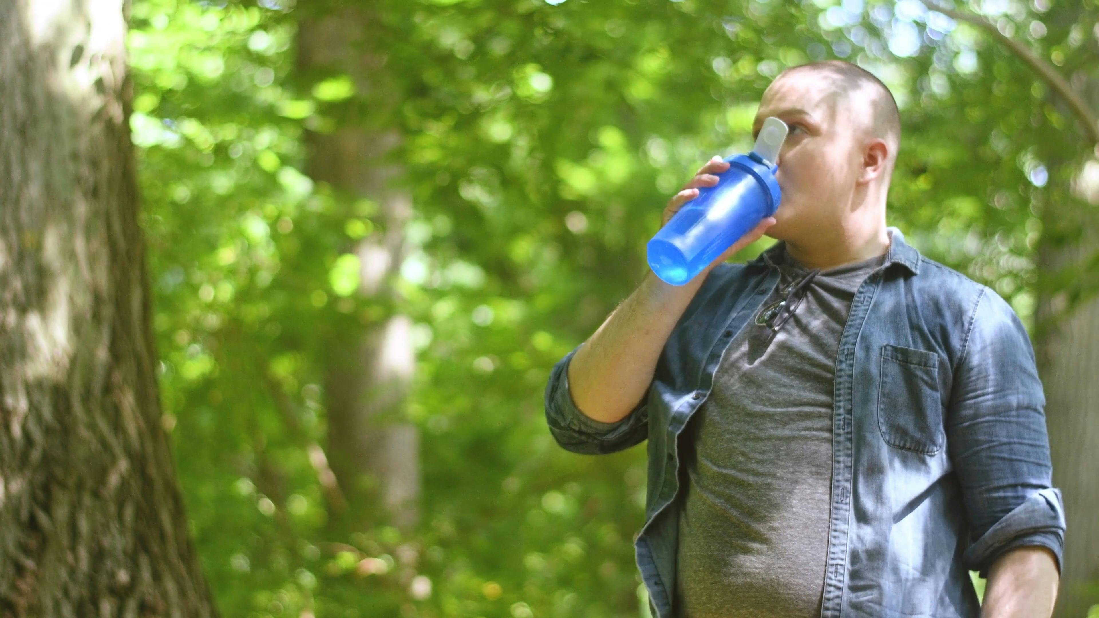 A guy Drinking Water with his Shades on Free Stock Video Footage ...
