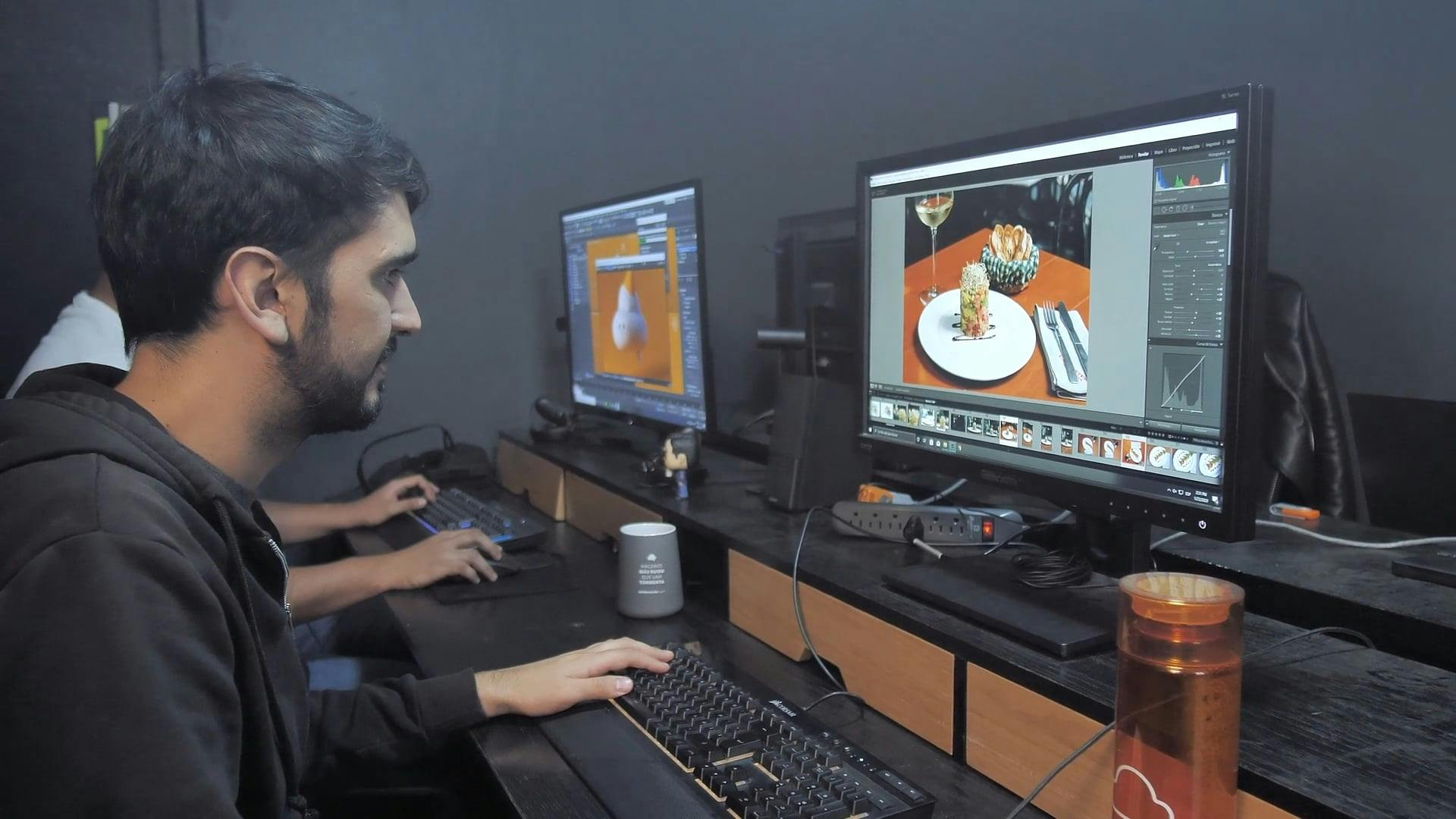 Men in Front of their Computer Editing Photos · Free Stock Video