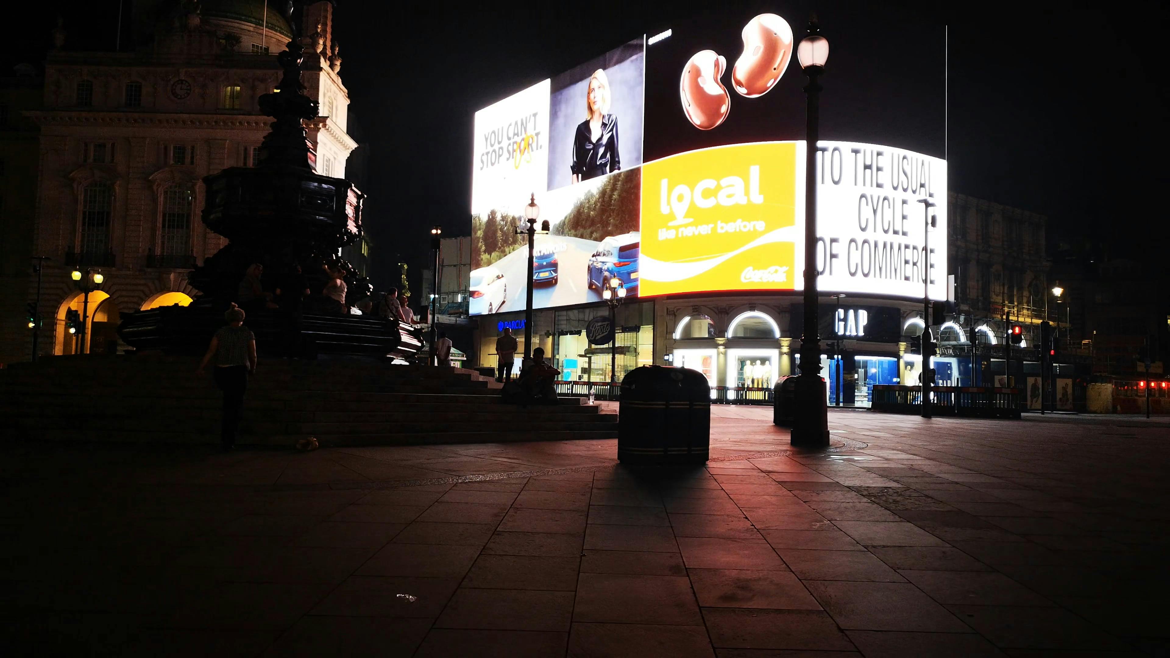 Illuminated Billboard Above A Building · Free Stock Video