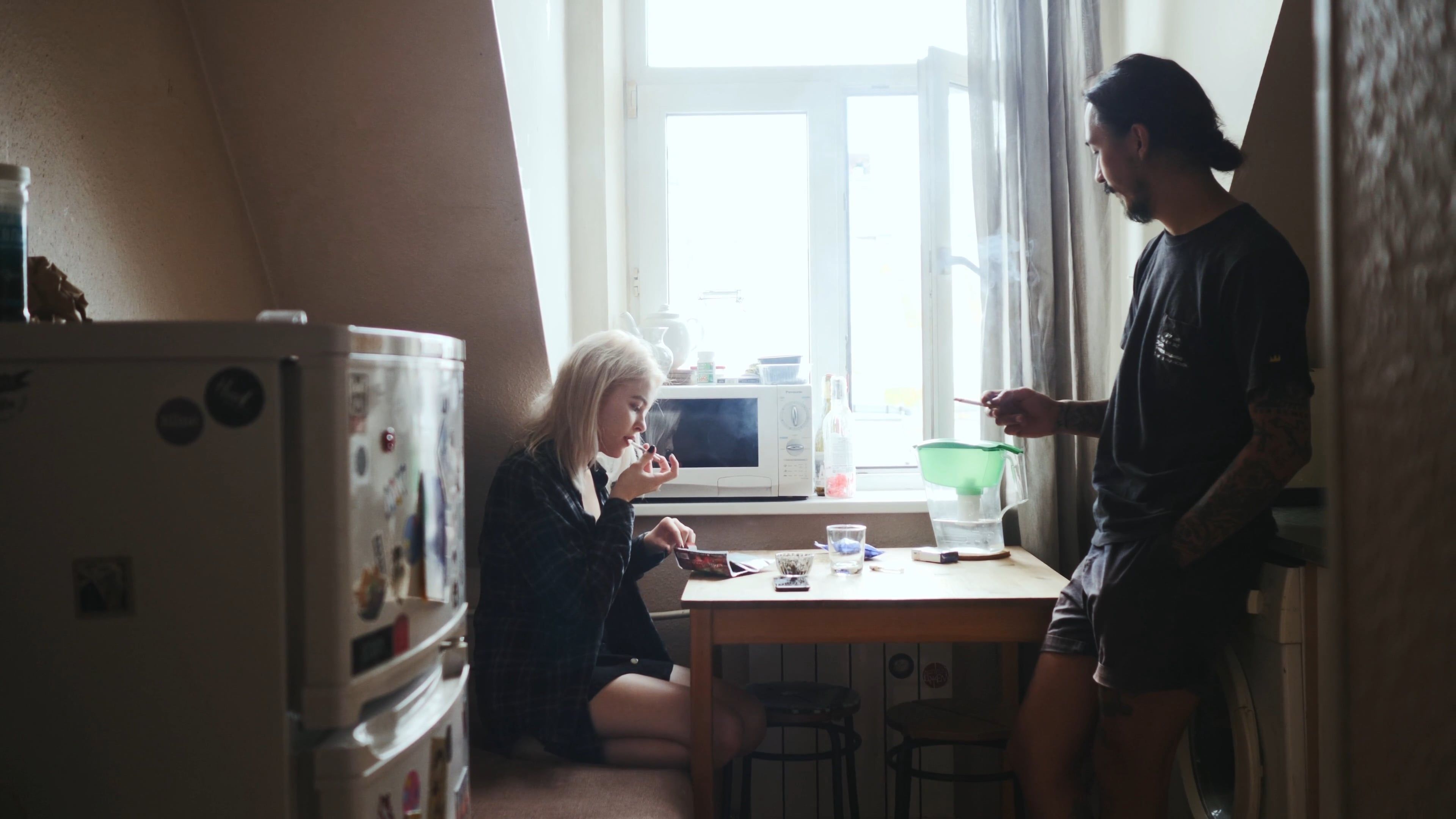 Couple Smoking in the Kitchen Free Stock Video Footage, Royalty-Free 4K ...